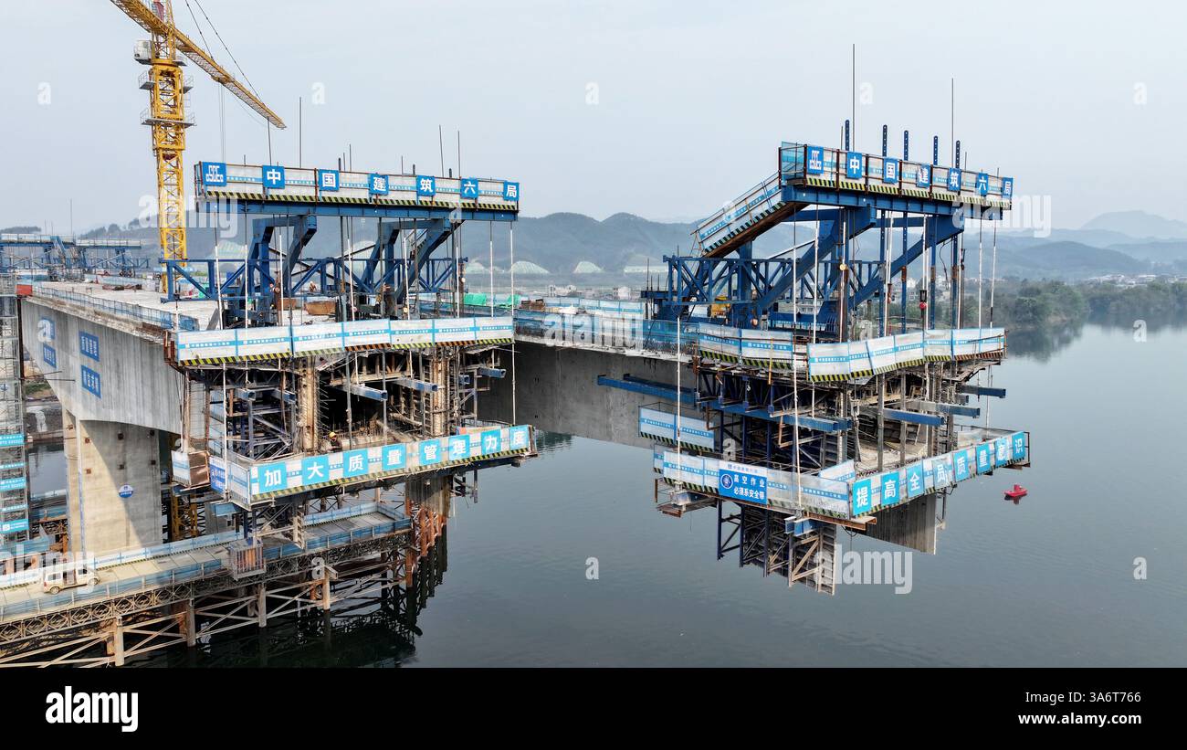 Liuzhou, China. 26th Mar, 2025. Workers are working at the construction ...