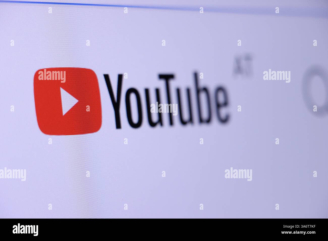 Youtube logo close-up displayed on screen with search bar visible Stock ...