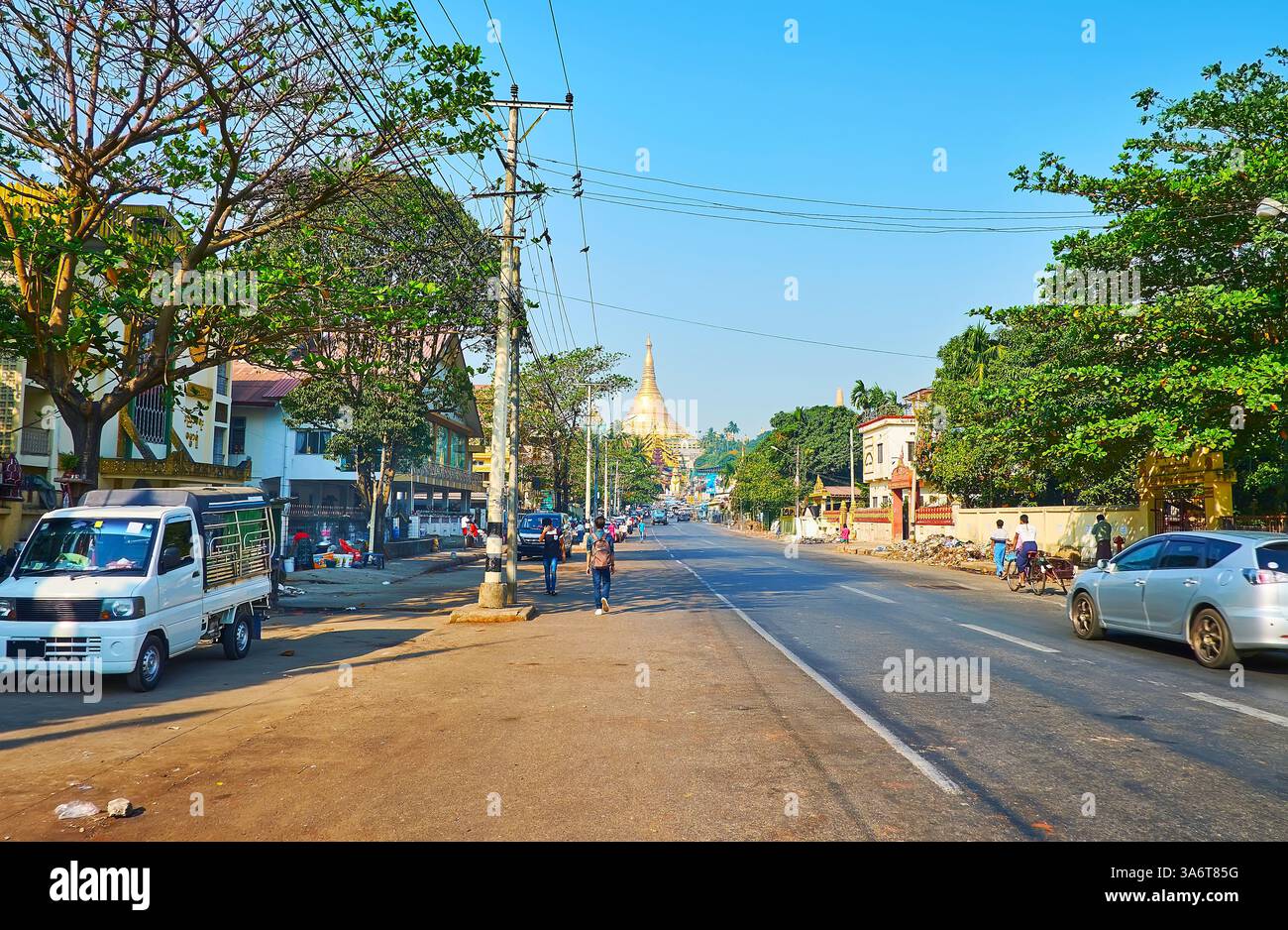 The Gyar Tawya street with Buddhist monasteries, shrines, food markets ...