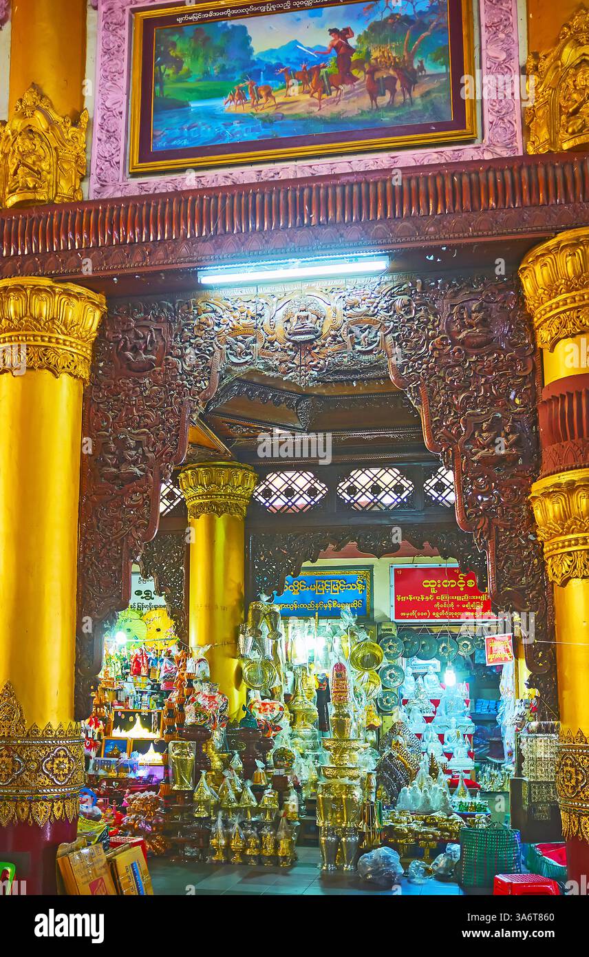 YANGON, MYANMAR - FEBRUARY 27, 2018: Different religious goods in ...