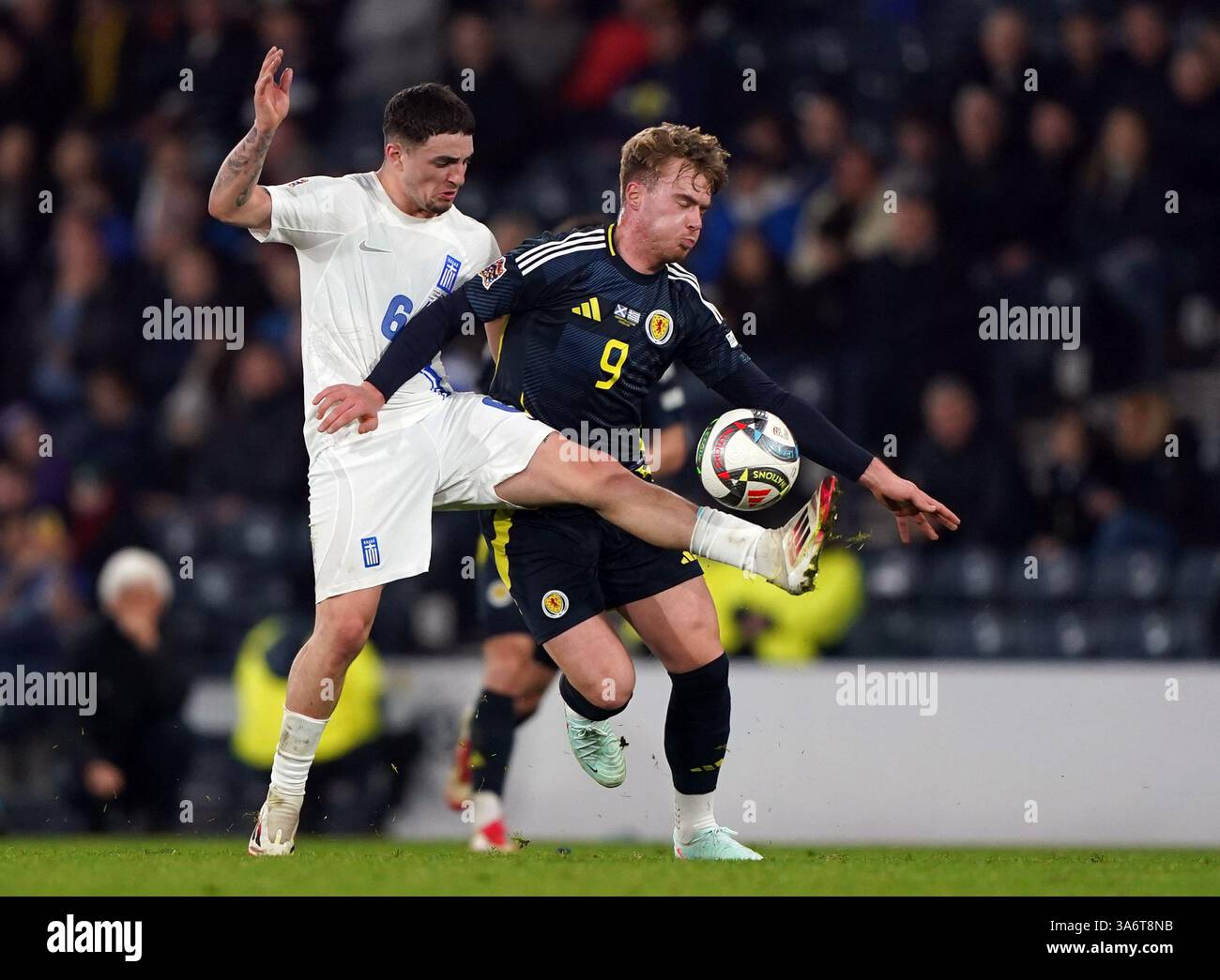 Scotland's Tommy Conway (right) and Greece's Christos Zafeiris battle ...
