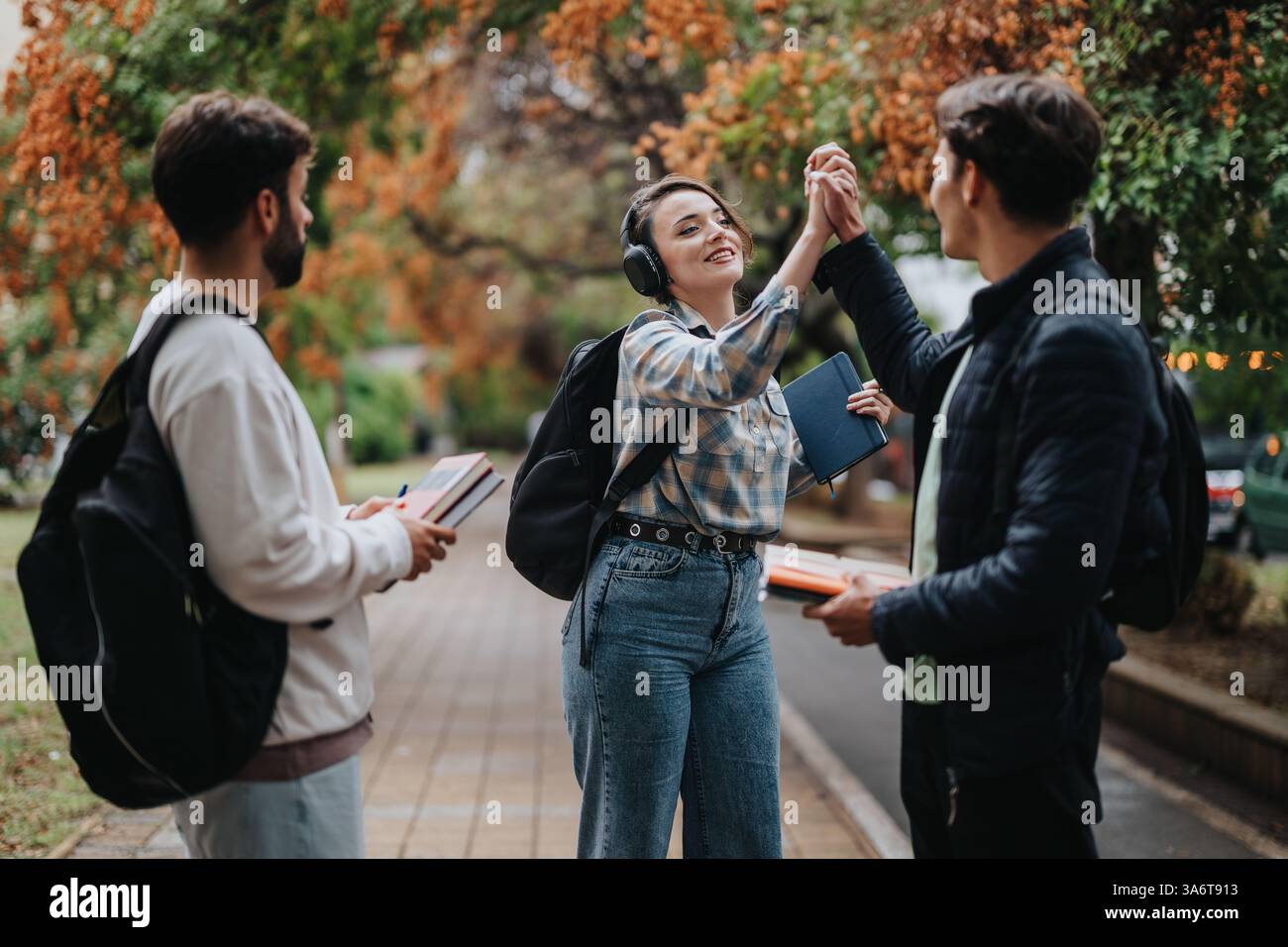 Students celebrating exam success hi-res stock photography and images ...
