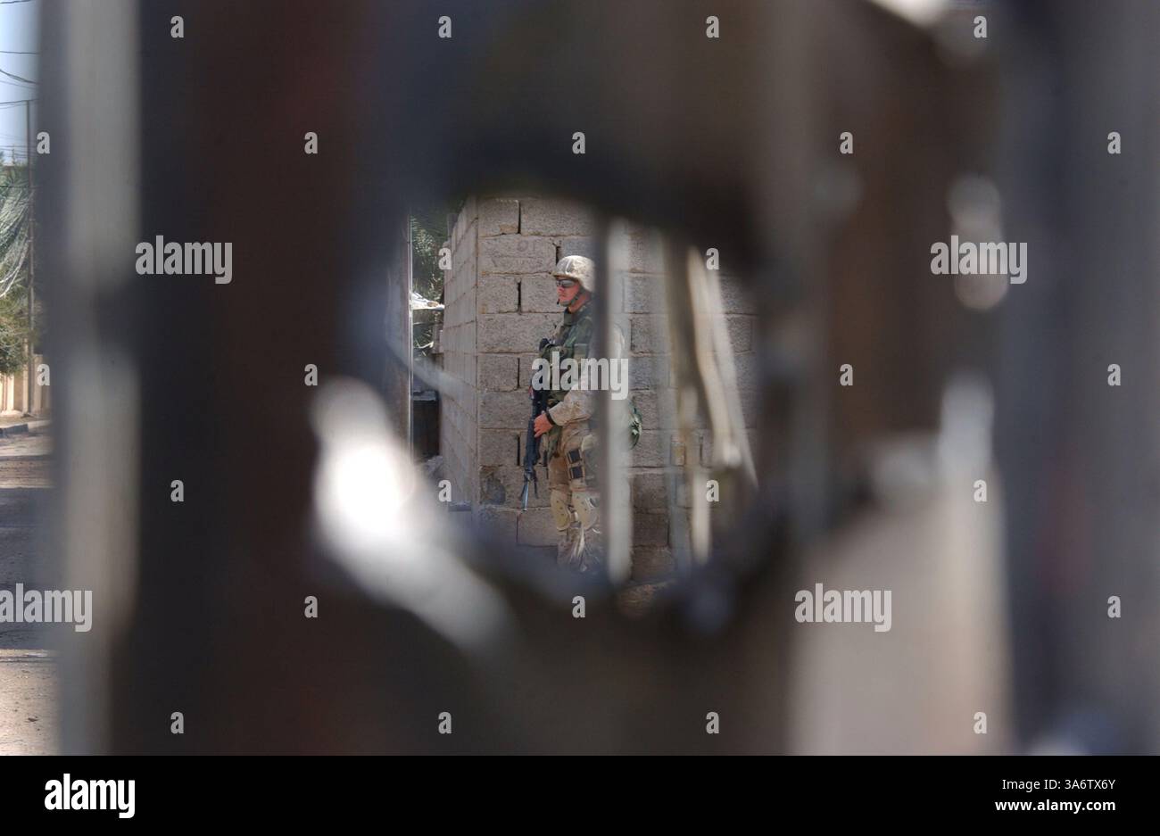Nov 09, 2004; Fallujah, Iraq; Petty Officer 3rd Class KYLE L. COKER ...