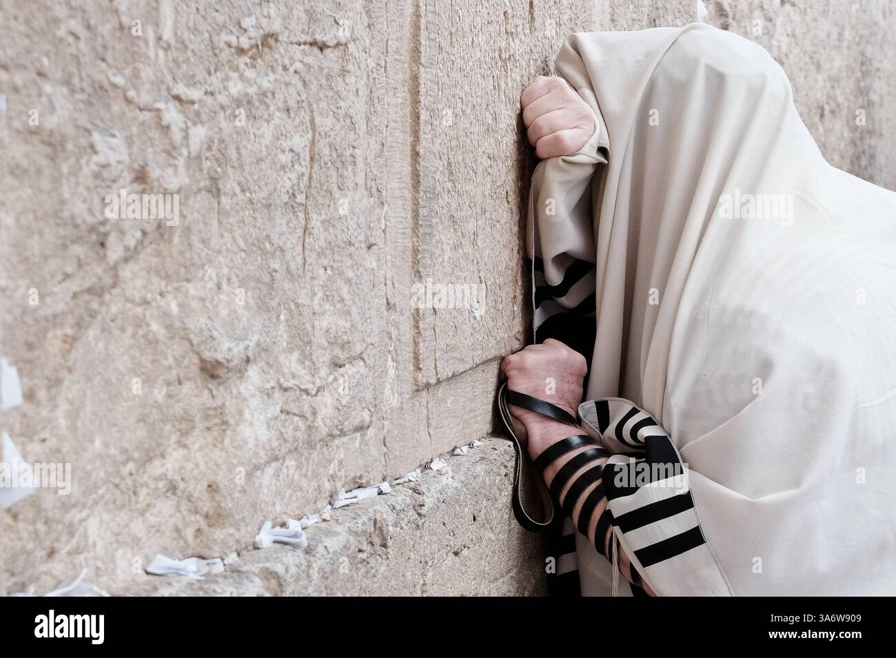 Feb. 16, 2015 - Jerusalem, Israel - A man leans on the Western Wall in ...