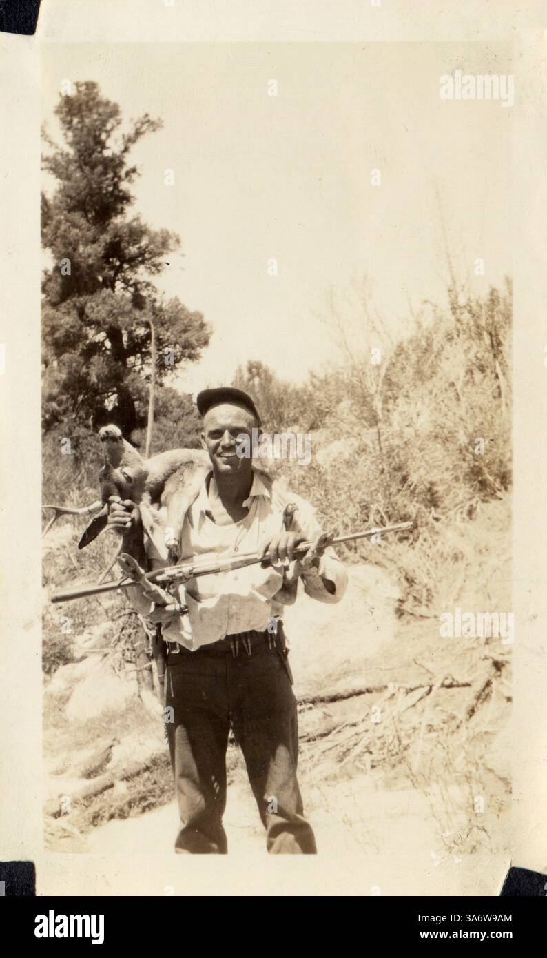 Vintage hunter posing with deer hi-res stock photography and images - Alamy