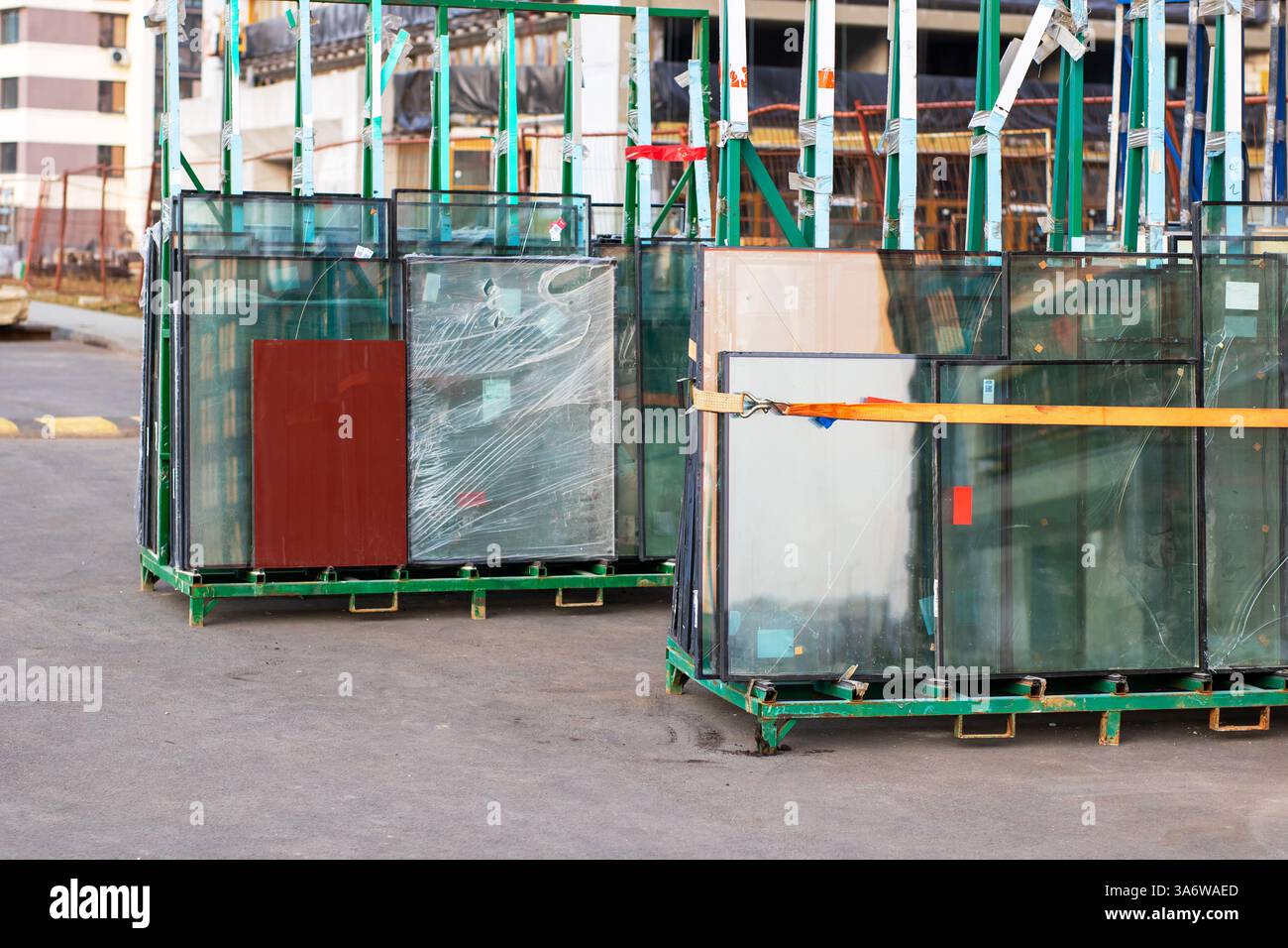 A large number of crates filled with glass are currently positioned on ...