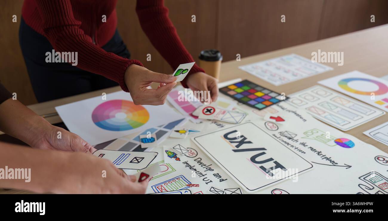 Interactive Design Elements in UX UI. A group collaborates around ...