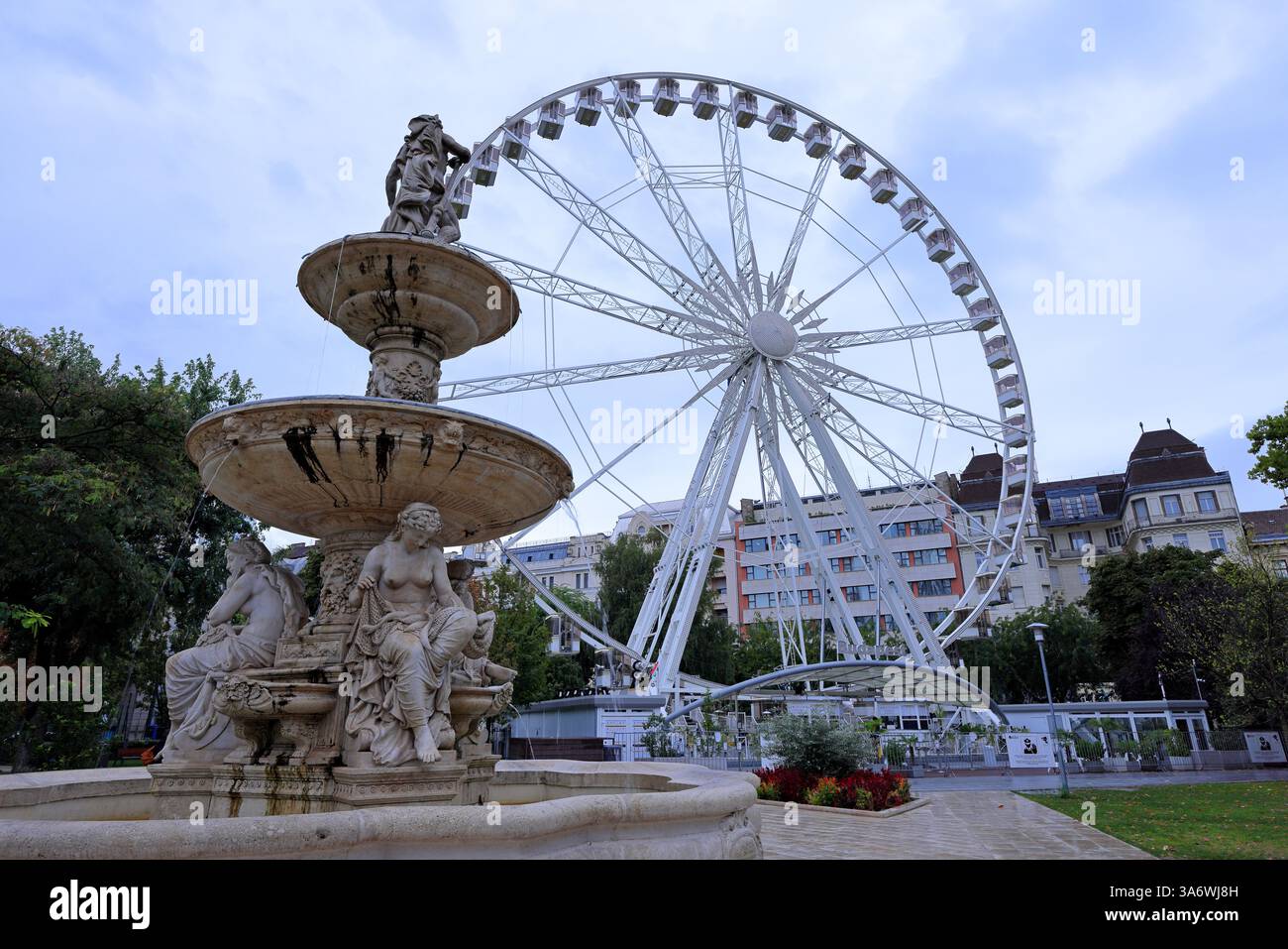 Elizabeth Square, Park square with an ornamental fountainand, Ferris ...