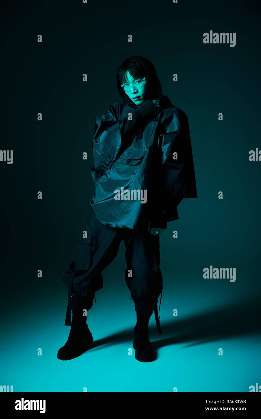 Handsome asian man showcases trendsetting fashion while striking an ...