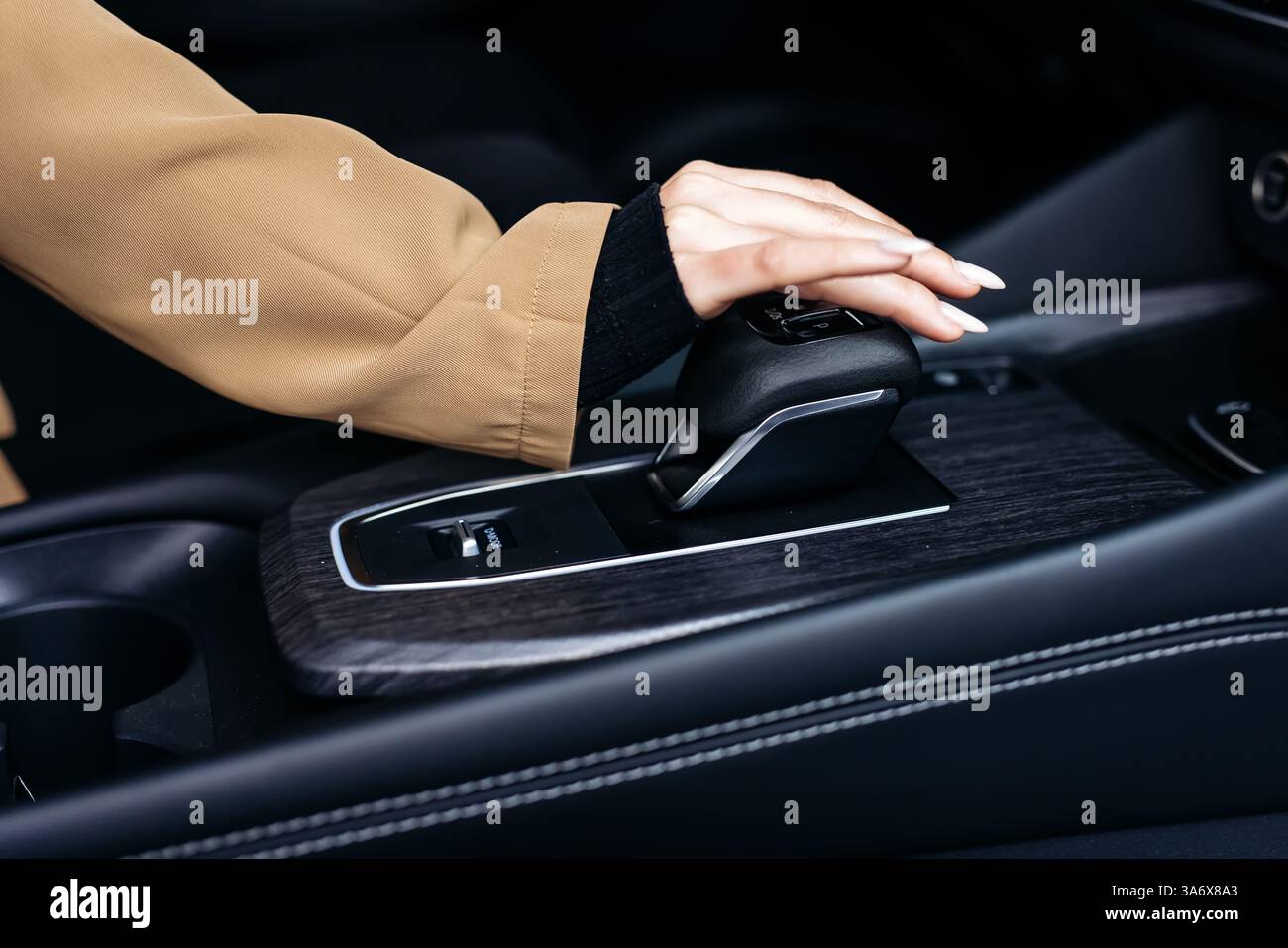 A close-up of the gearbox of a modern, new car. Concept of stylish ...