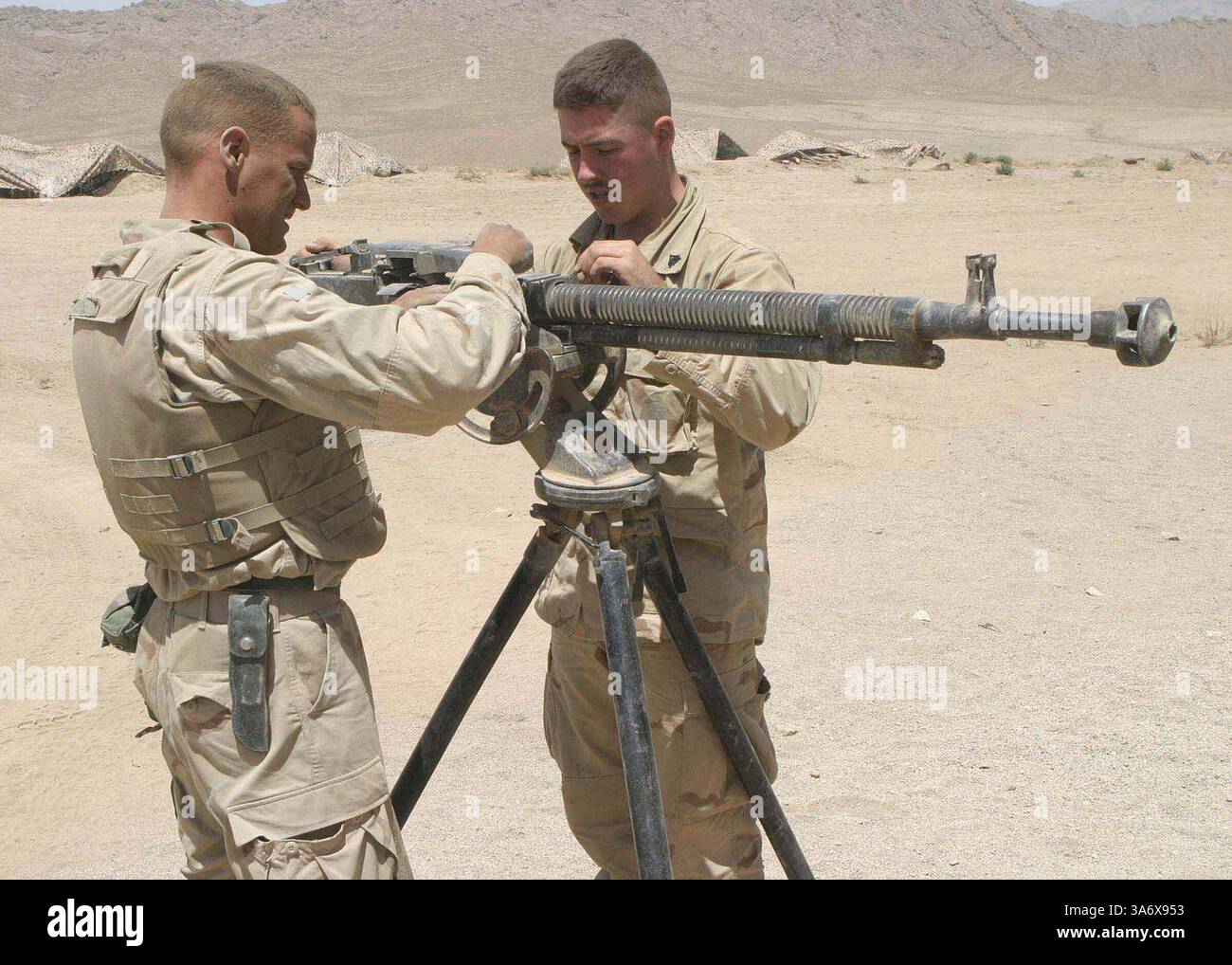 May 16, 2004; Central, Afghanistan; Staff Sgt. JEREMY COPPOLA and Cpl ...