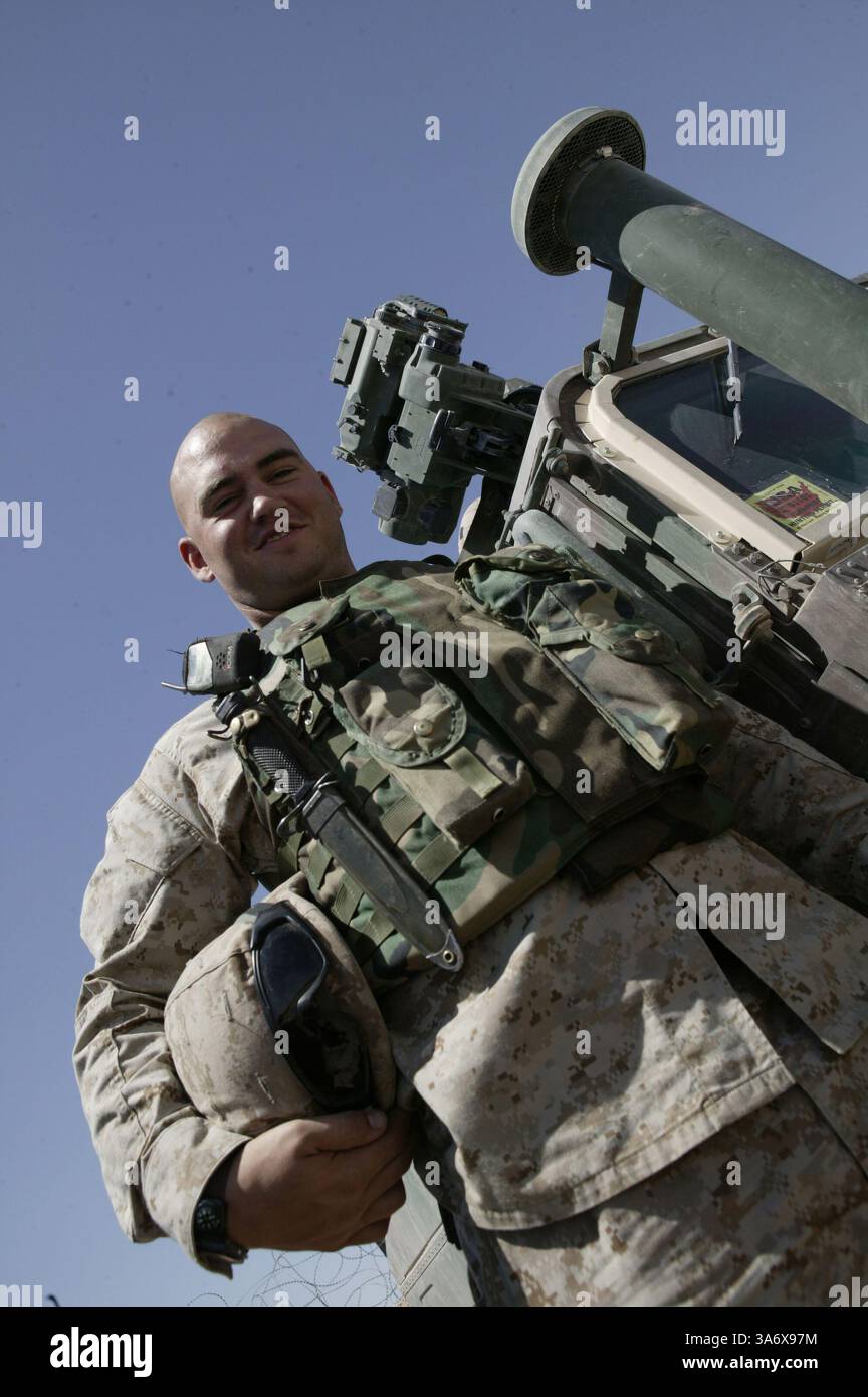 Jul 11, 2004; Camp Taqaddum, Iraq; Sgt. JACOB JOHNSTON, 24, holds the ...