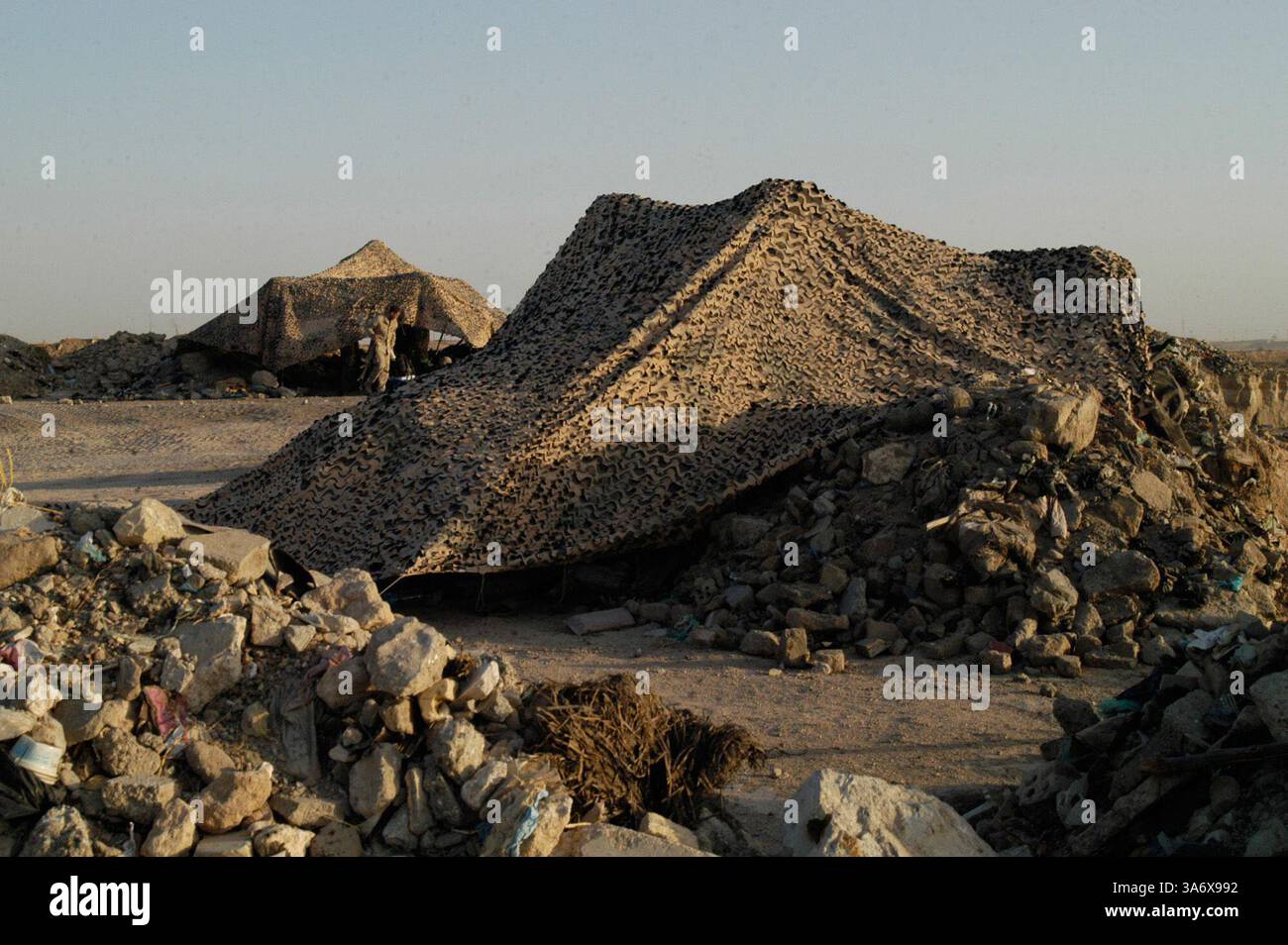 Jul 17, 2004; Fallujah, Iraq; To battle back Iraq's heat in the middle ...