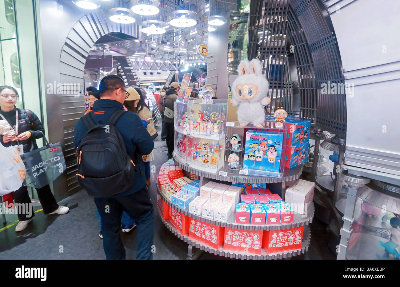Tourists shop at the world's largest flagship store of Fashion Play ...