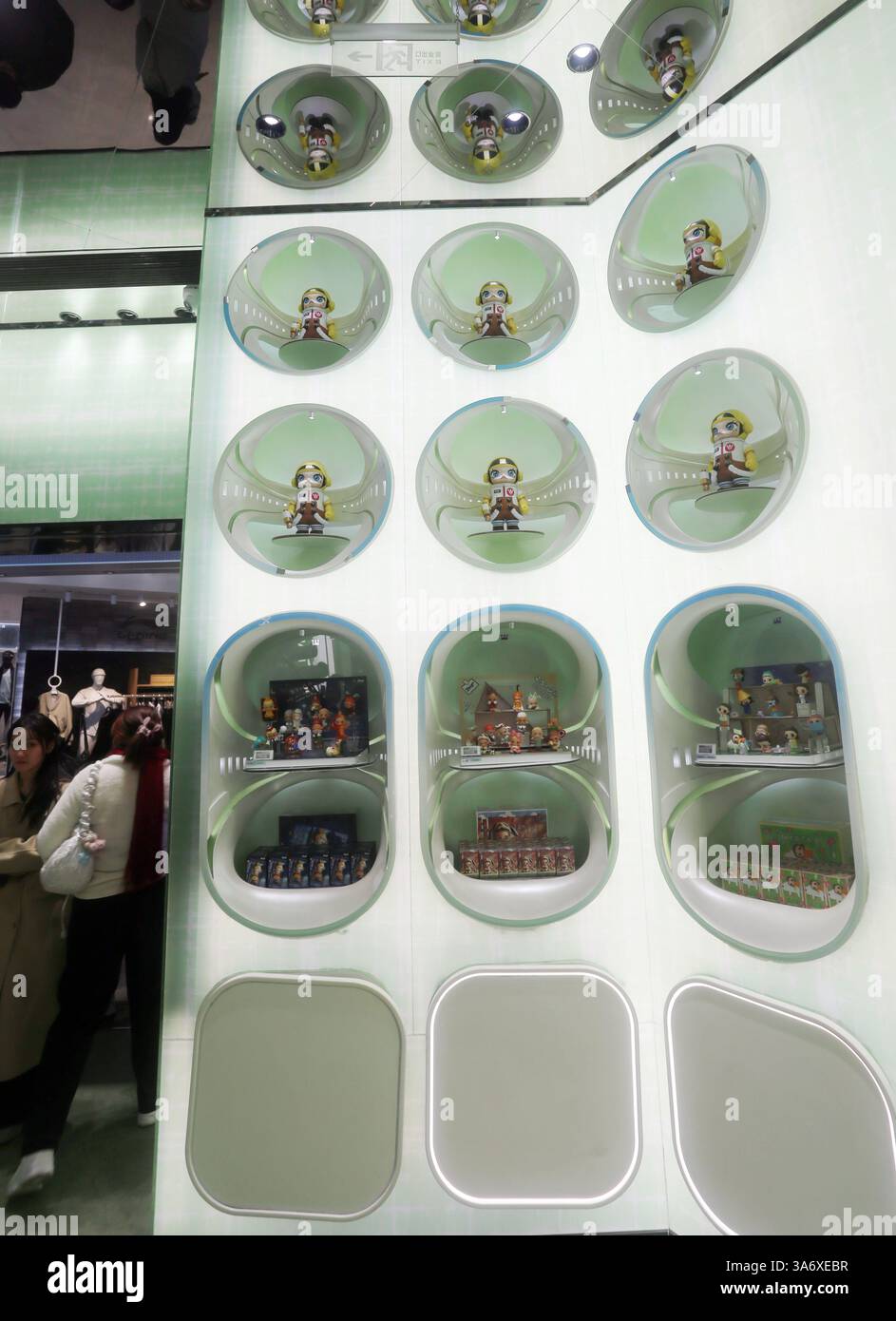 Tourists shop at the world's largest flagship store of Fashion Play ...