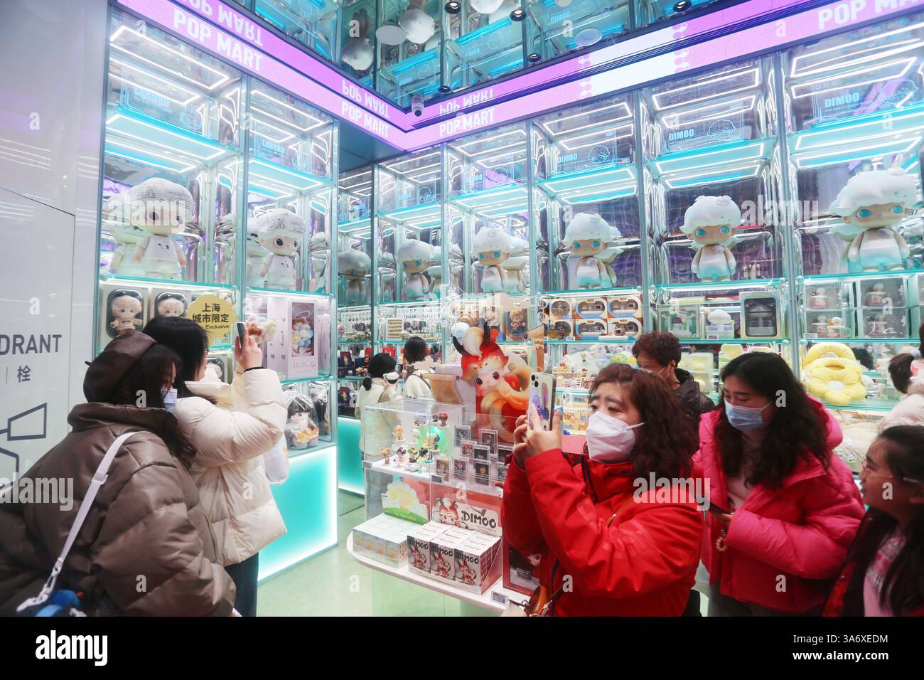 Tourists shop at the world's largest flagship store of Fashion Play ...