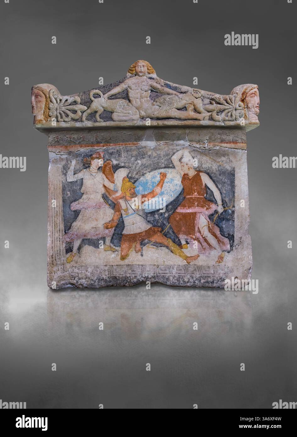 A rare Etruscan full length painted sarcophagus with paintings ...