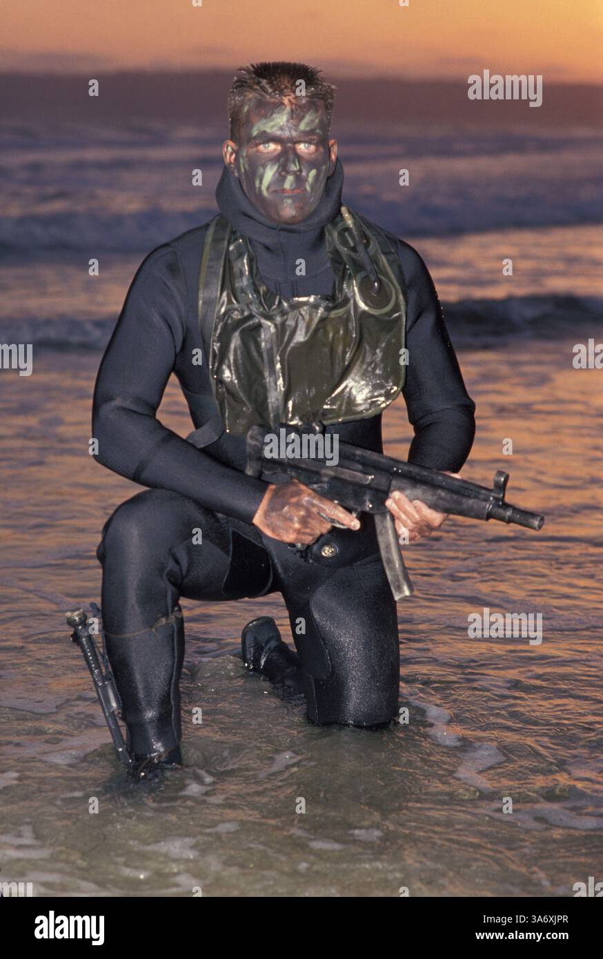 May 20, 1991; San Diego, CA, USA; A U.S. Navy Seal in training holds a ...