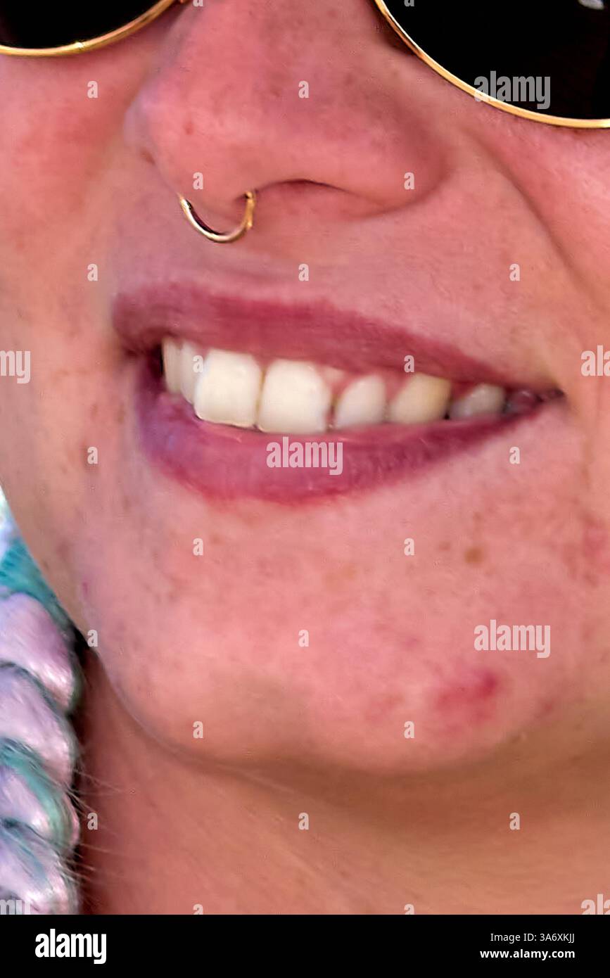 Catania. Italy - March 26, 2025: Close-up image of a smiling mouth ...