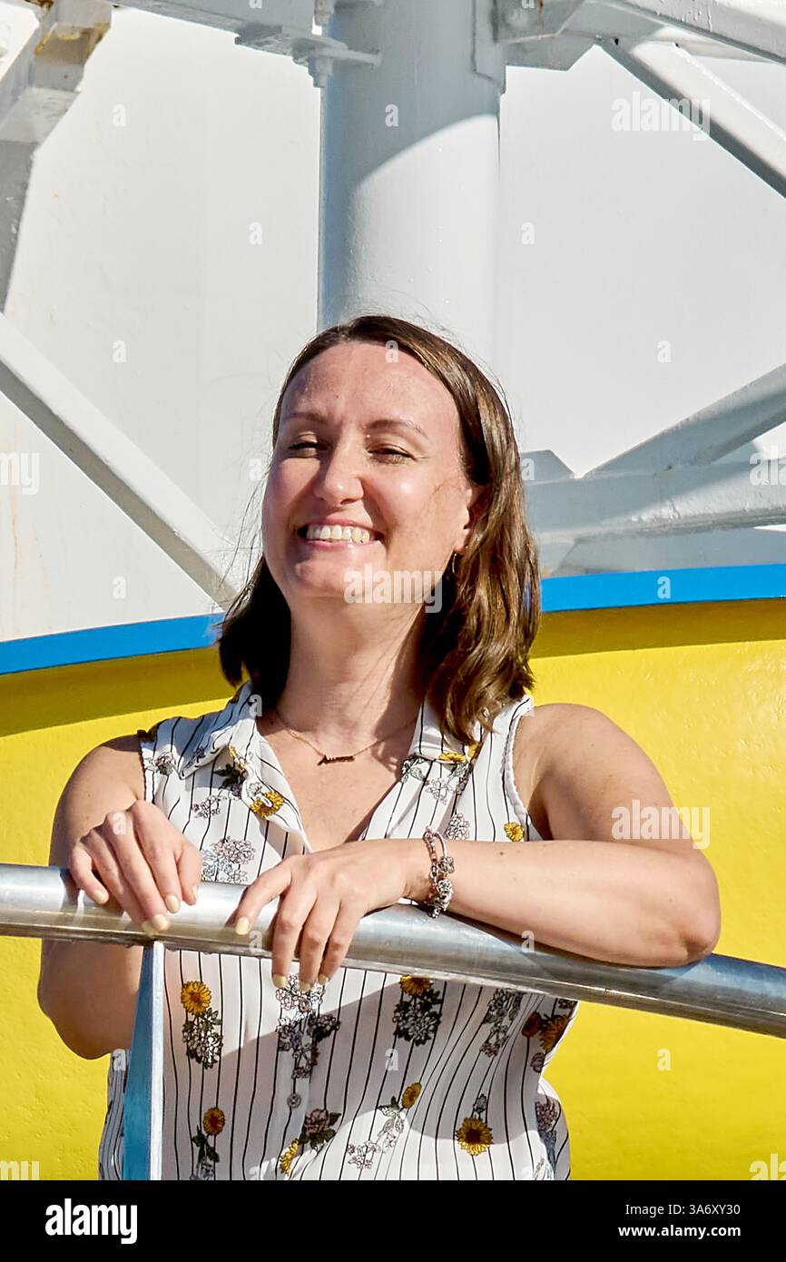 Casual yet chic, this woman s attire combines bright floral designs ...