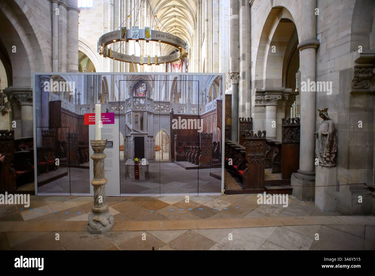26 March 2025, Saxony-Anhalt, Magdeburg: A poster with the image of ...