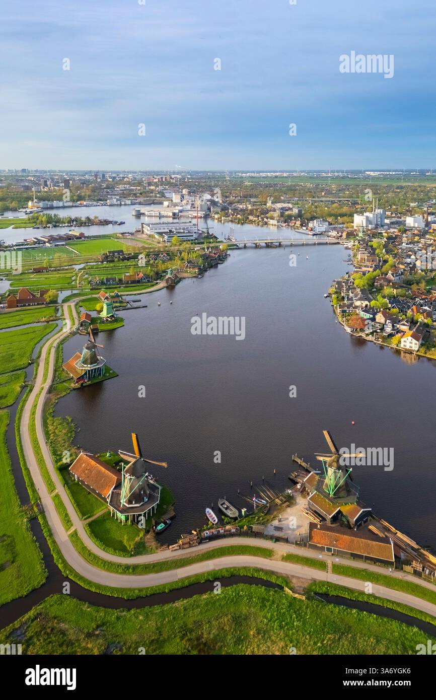 Aerial view of the typical windmills of Zaanse Schans on the river Zaan ...
