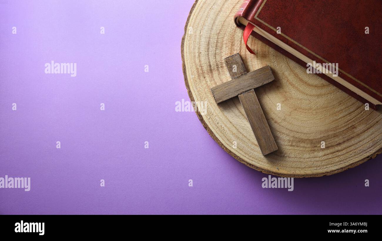 Religious background with tools for prayer with a Bible on wooden base ...