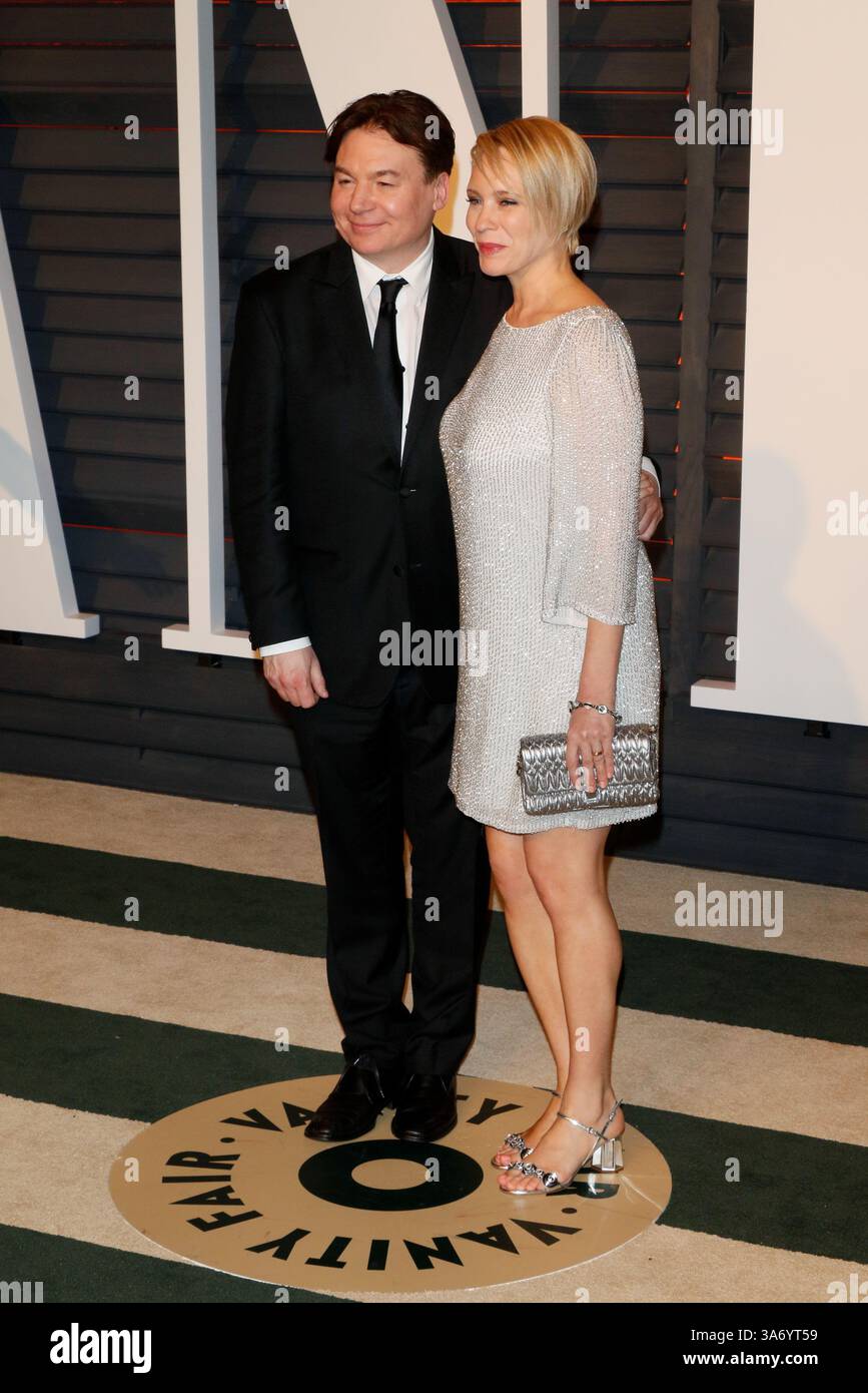 Actor Mike Myers and Kelly Tisdale attend the Vanity Fair Oscar Party ...