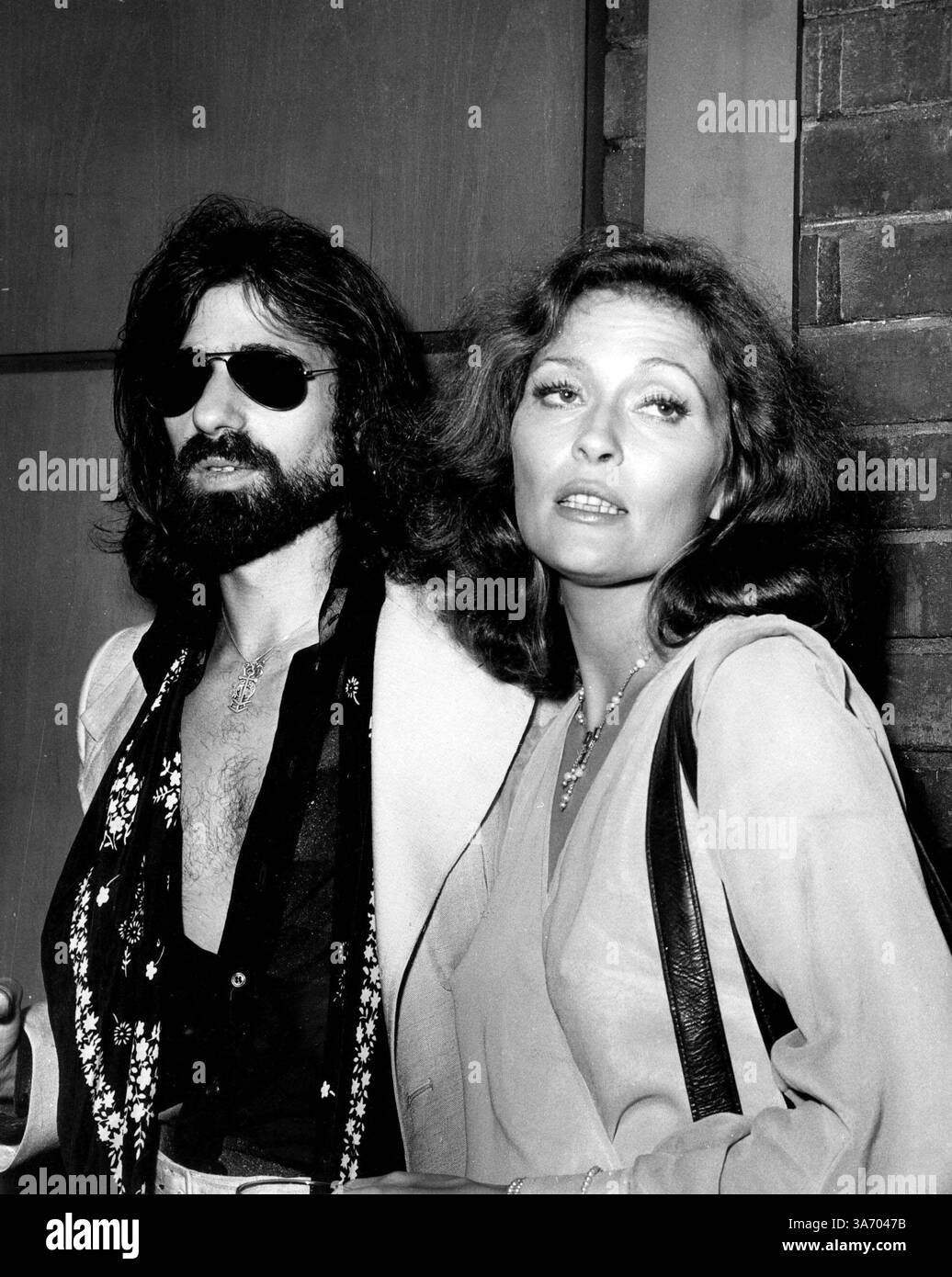 June 14, 2005 - FAYE DUNAWAY WITH PETER WOLF.#1405.© NATE CUTLER ...