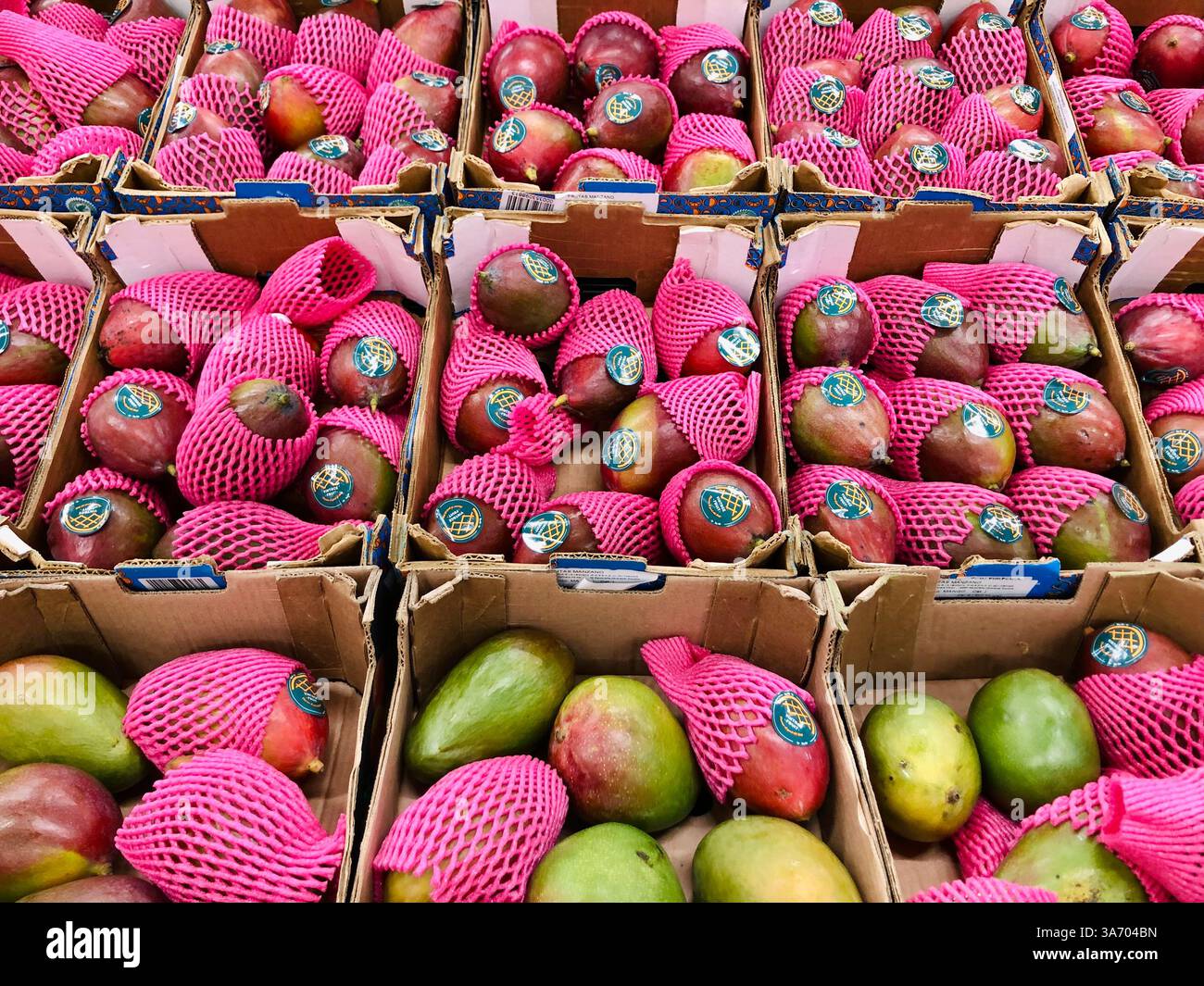 Alicante, Spain - March 25, 2025: Mango fruit in bright packaging in ...