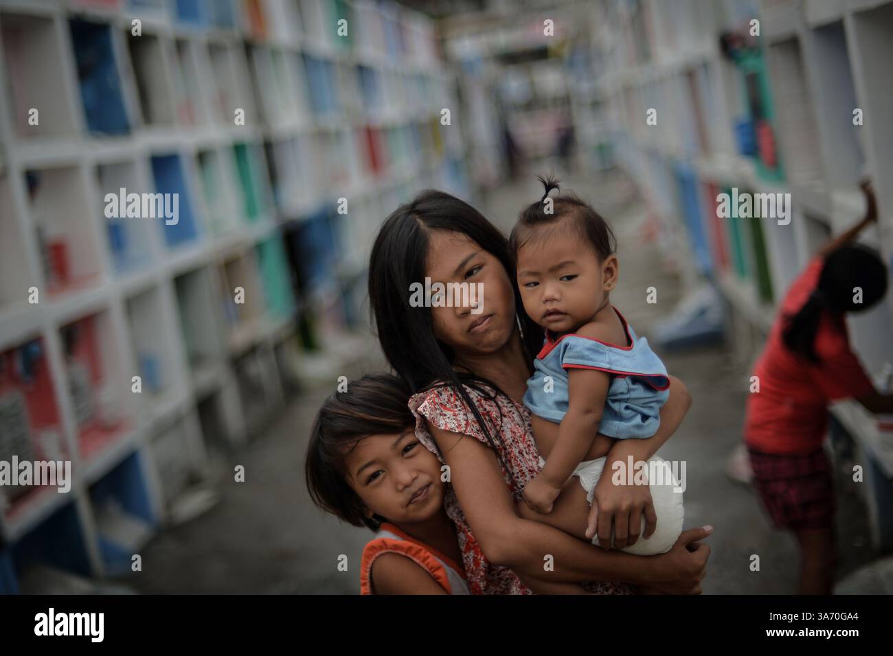 Oct. 29, 2014 - Paranaque, Philippines - Siblings who live in the area ...