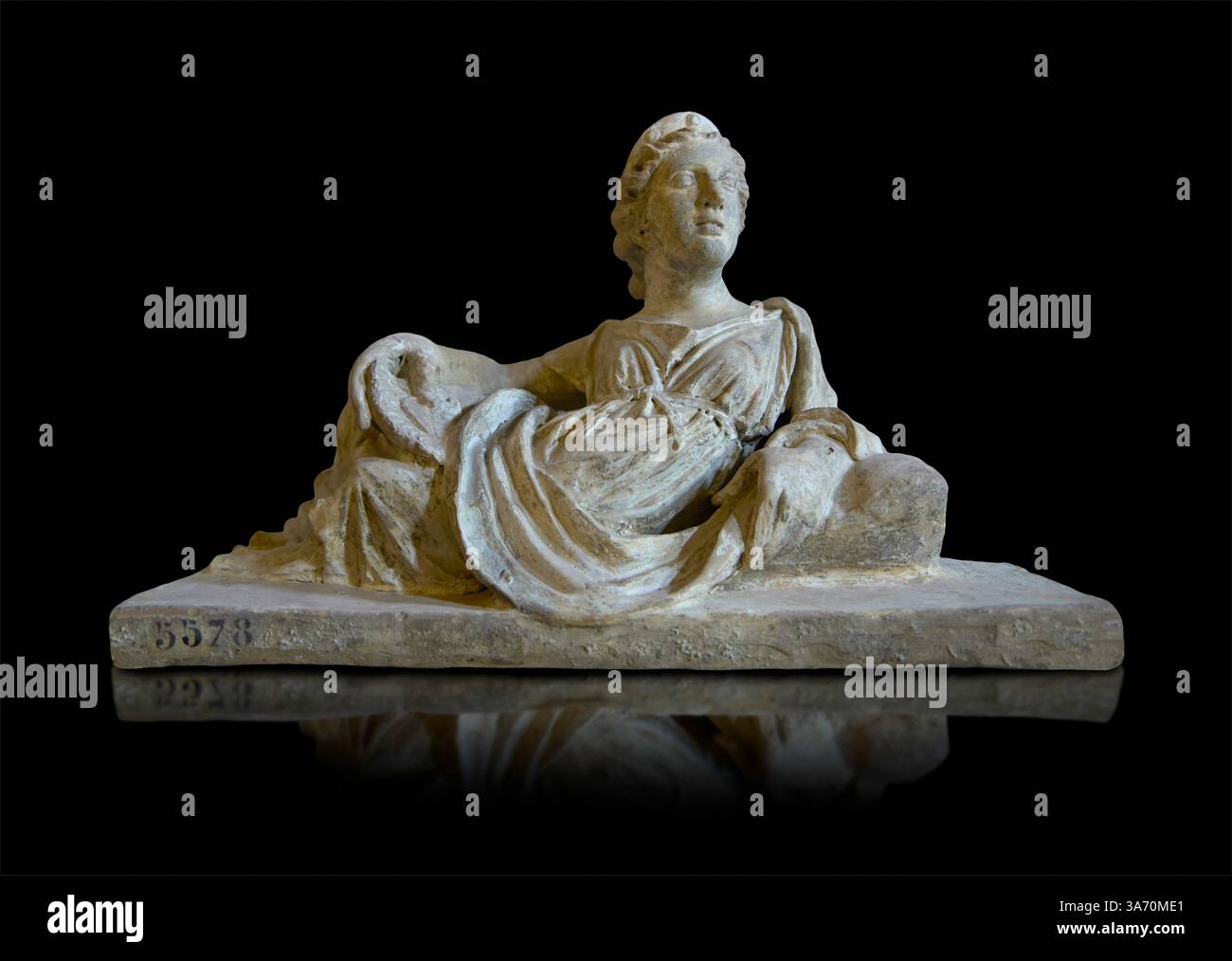 Reclining women on the lid of an Etruscan funerary cinerary urn ...