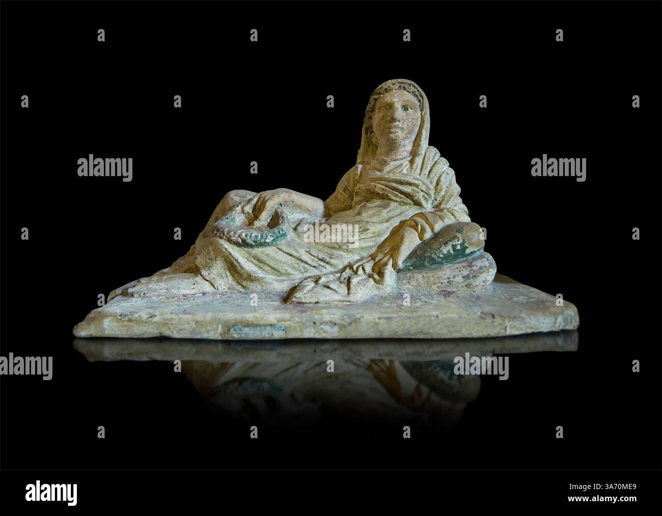 Reclining women on the lid of an Etruscan funerary cinerary urn ...