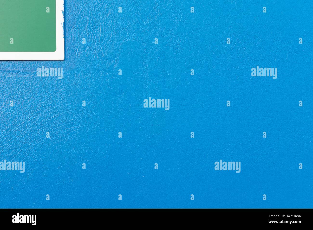 Minimalism style, Blue wall texture background with green label and ...