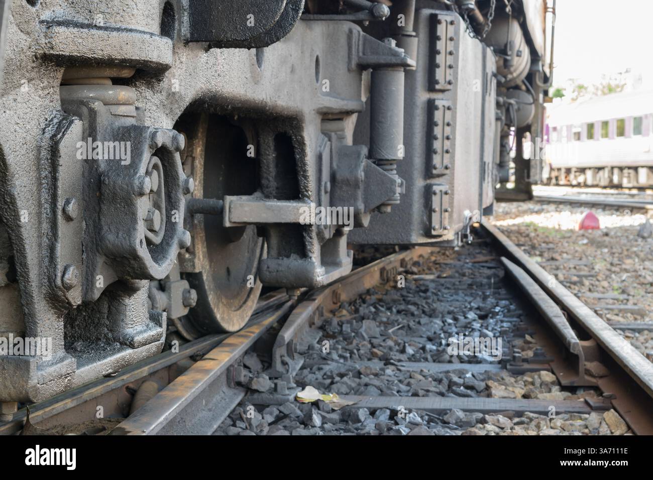 Zoom train suspension of a Public Thai Train Railway Stock Photo - Alamy