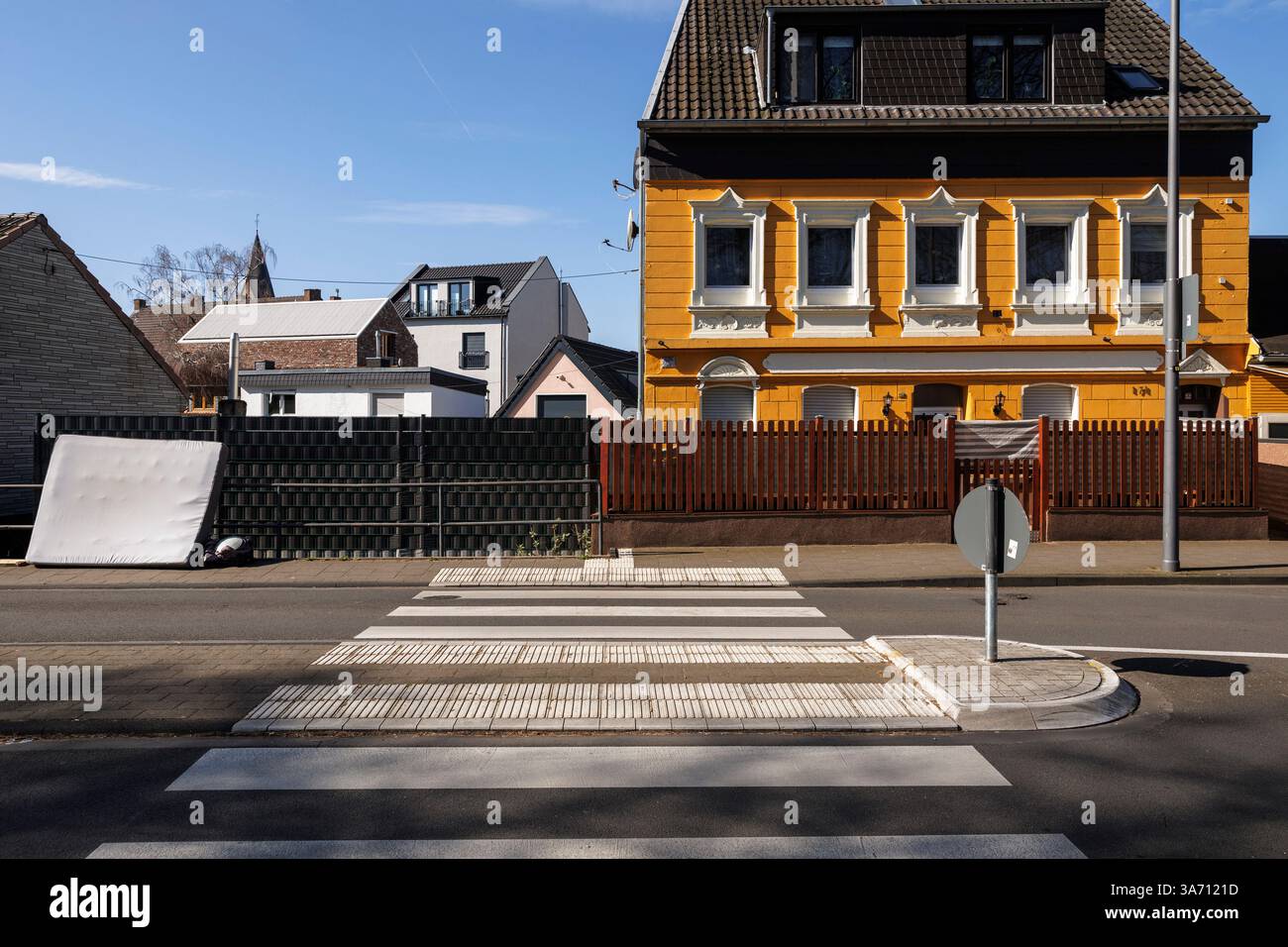 fenced-in residential houses in the Niehl district, wooden picket fence ...