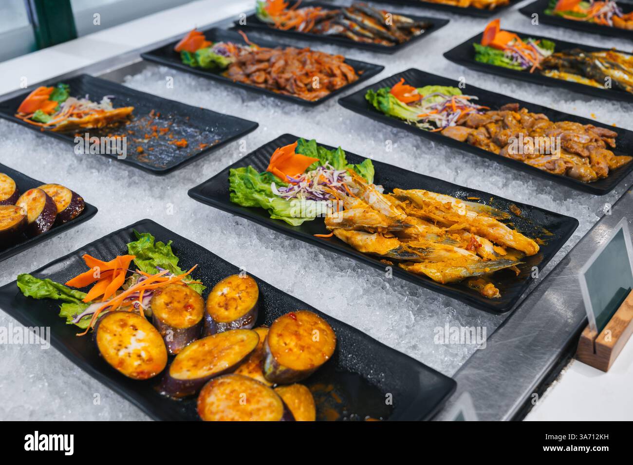 Vietnamese buffet in a hotel in Asia. Asian food and dishes at the self ...
