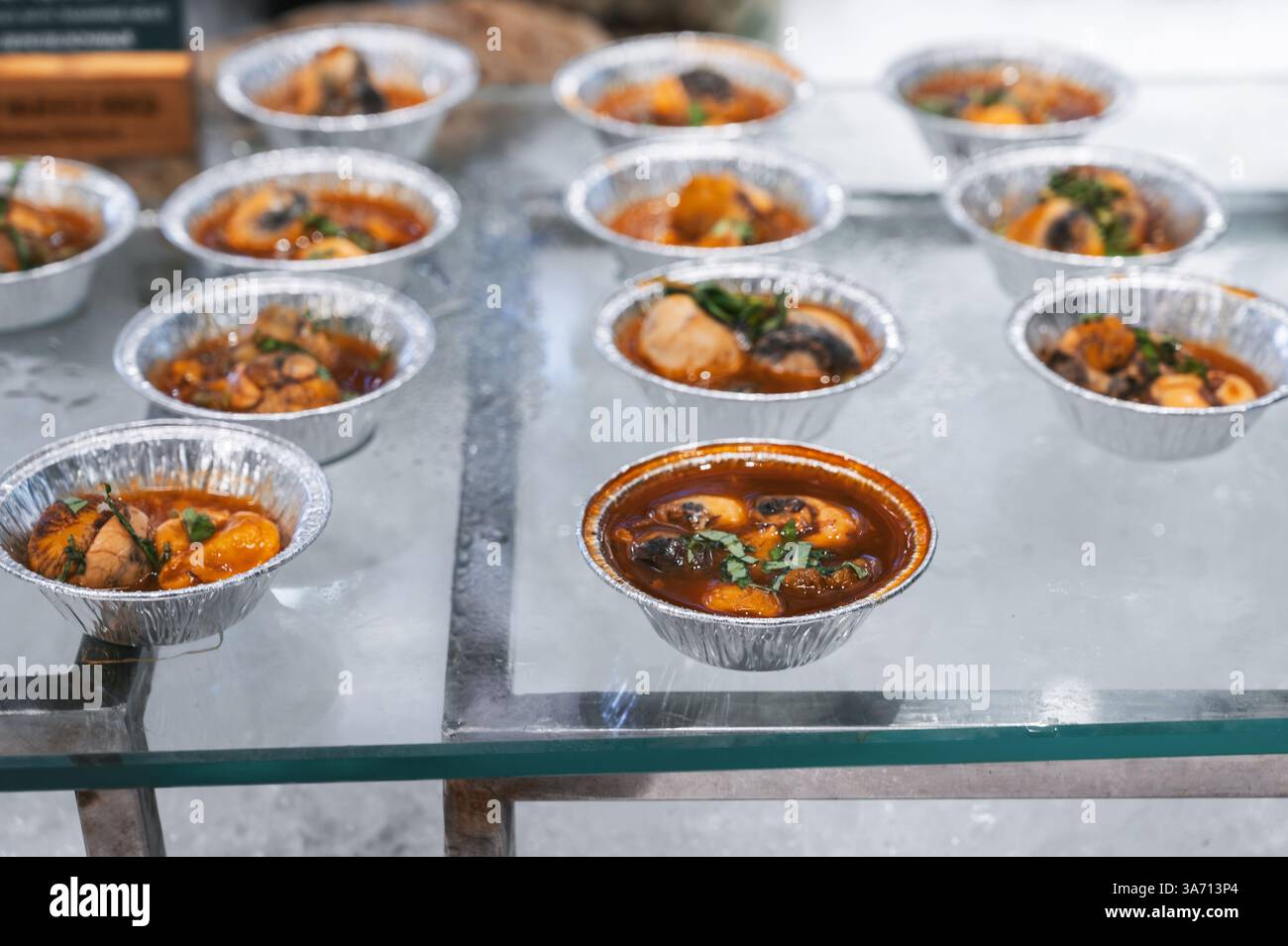 exotic Asian food duck egg balut with embryo for grilling in a buffet ...