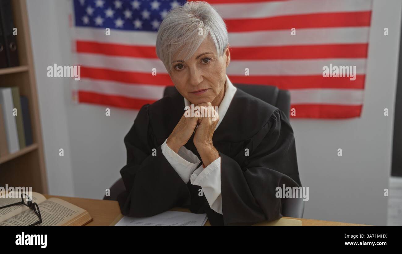 Mature woman judge with short grey hair in an office with an american ...
