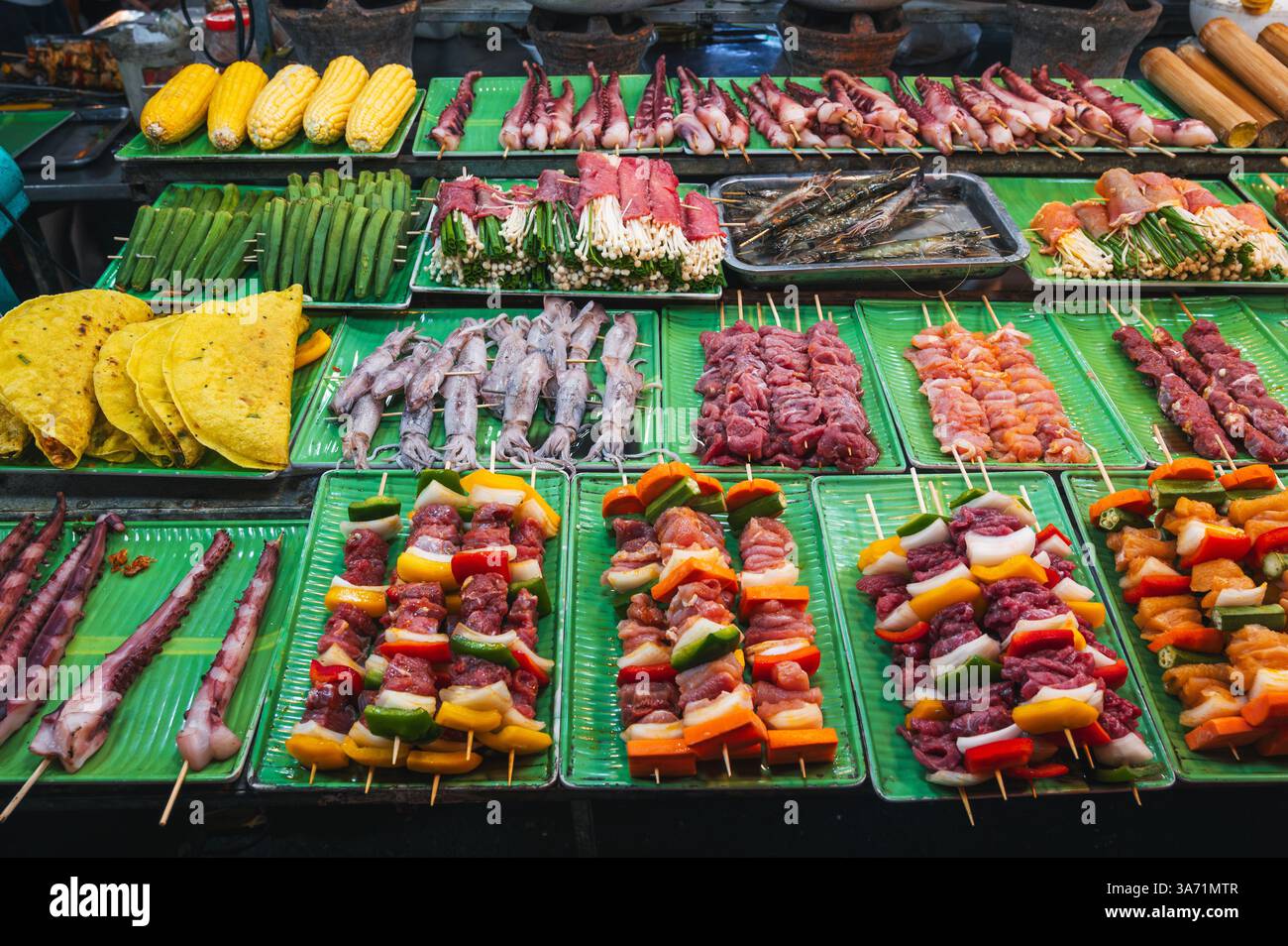assortment of traditional Vietnamese street food on the counter at the ...