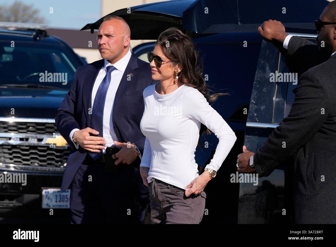 Homeland Security Secretary Kristi Noem arrives to board her plane ...