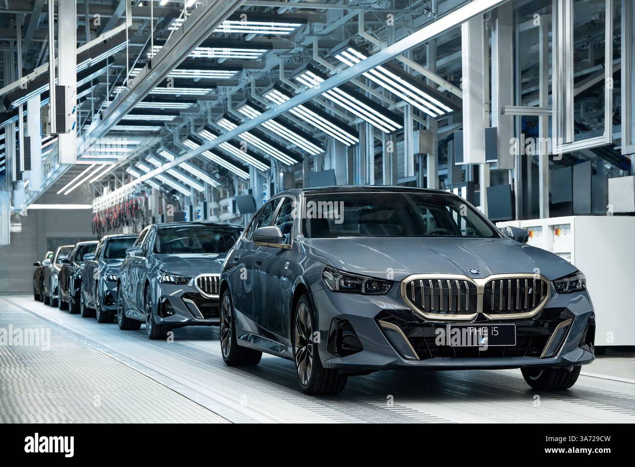 Beijing, China. 26th Mar, 2025. BMW i5 electric cars roll off the ...