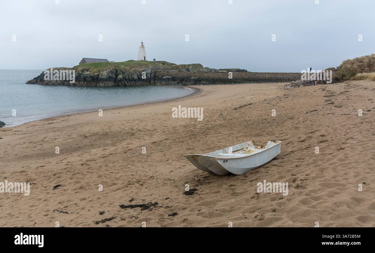 Shell of a boat washed up at Llanddwyn Island, Anglesey, North Wales ...