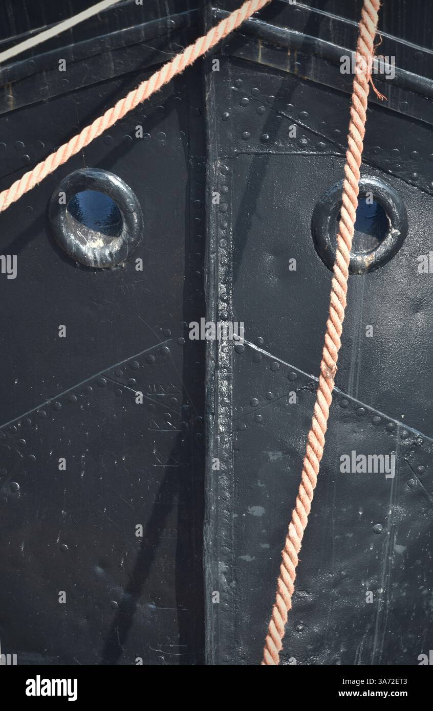 bow of old beached steel barge pin mill suffolk england Stock Photo - Alamy