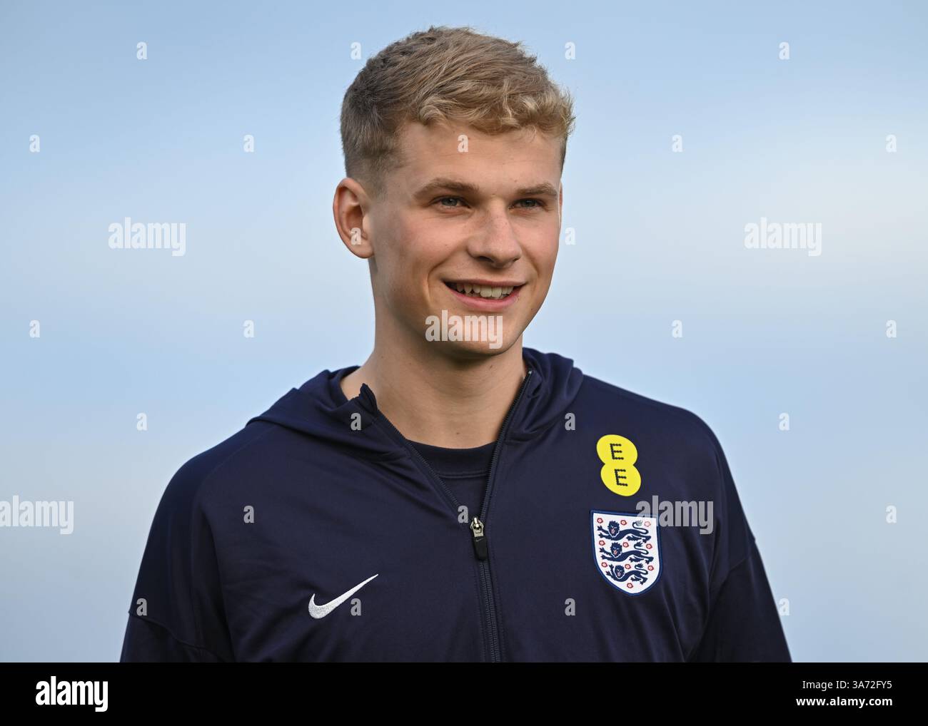 Deeside, Wales, 25th March 2025. Zach Abbott of England inspects the ...