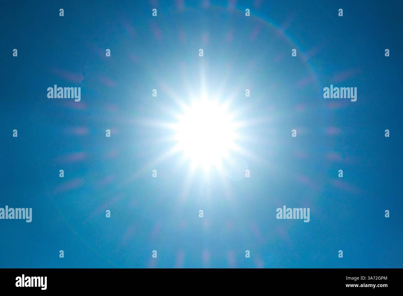 Large sun glaring against hi-res stock photography and images - Alamy