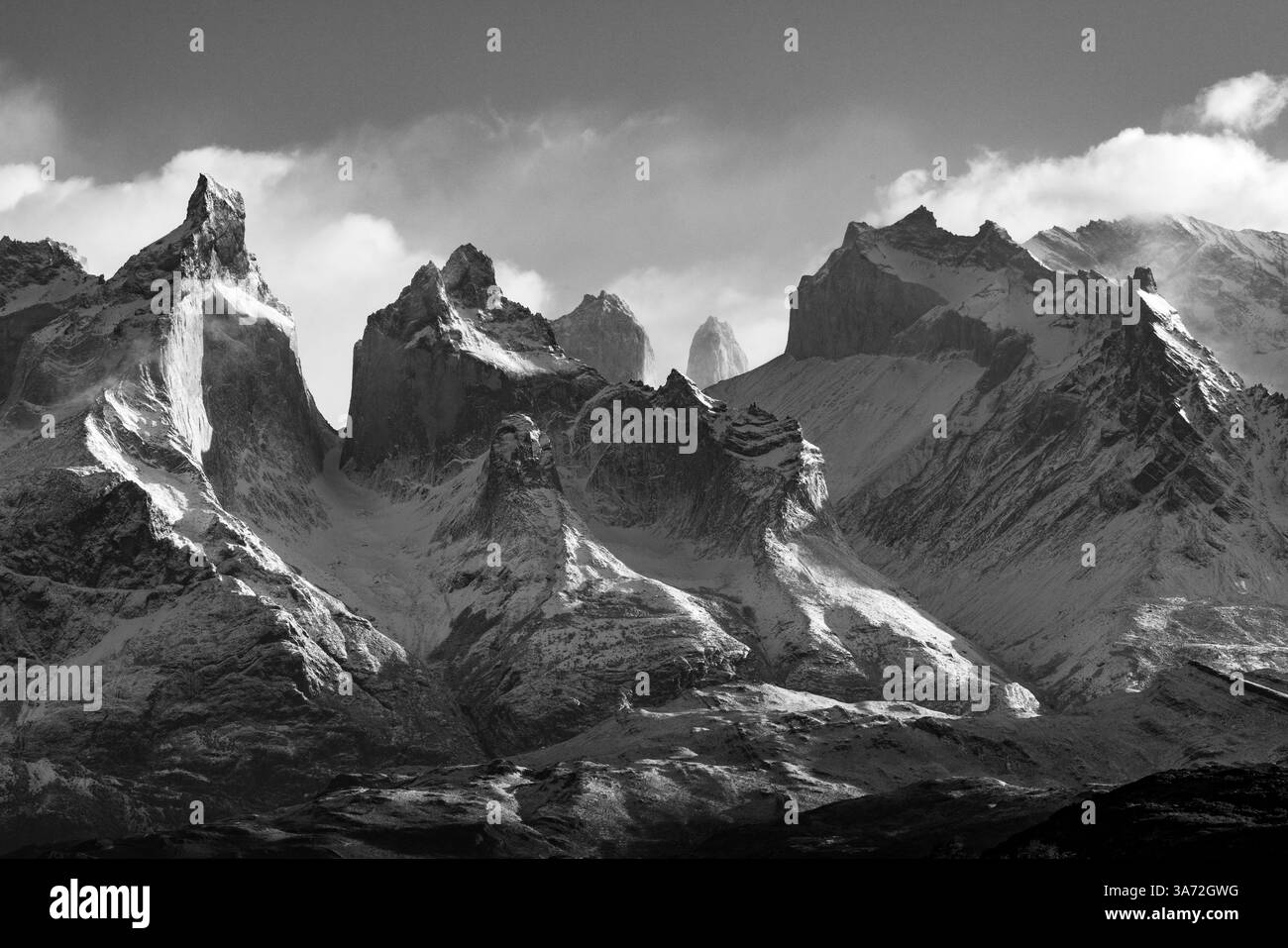 Majestic mountain range snow covered Black and White Stock Photos ...