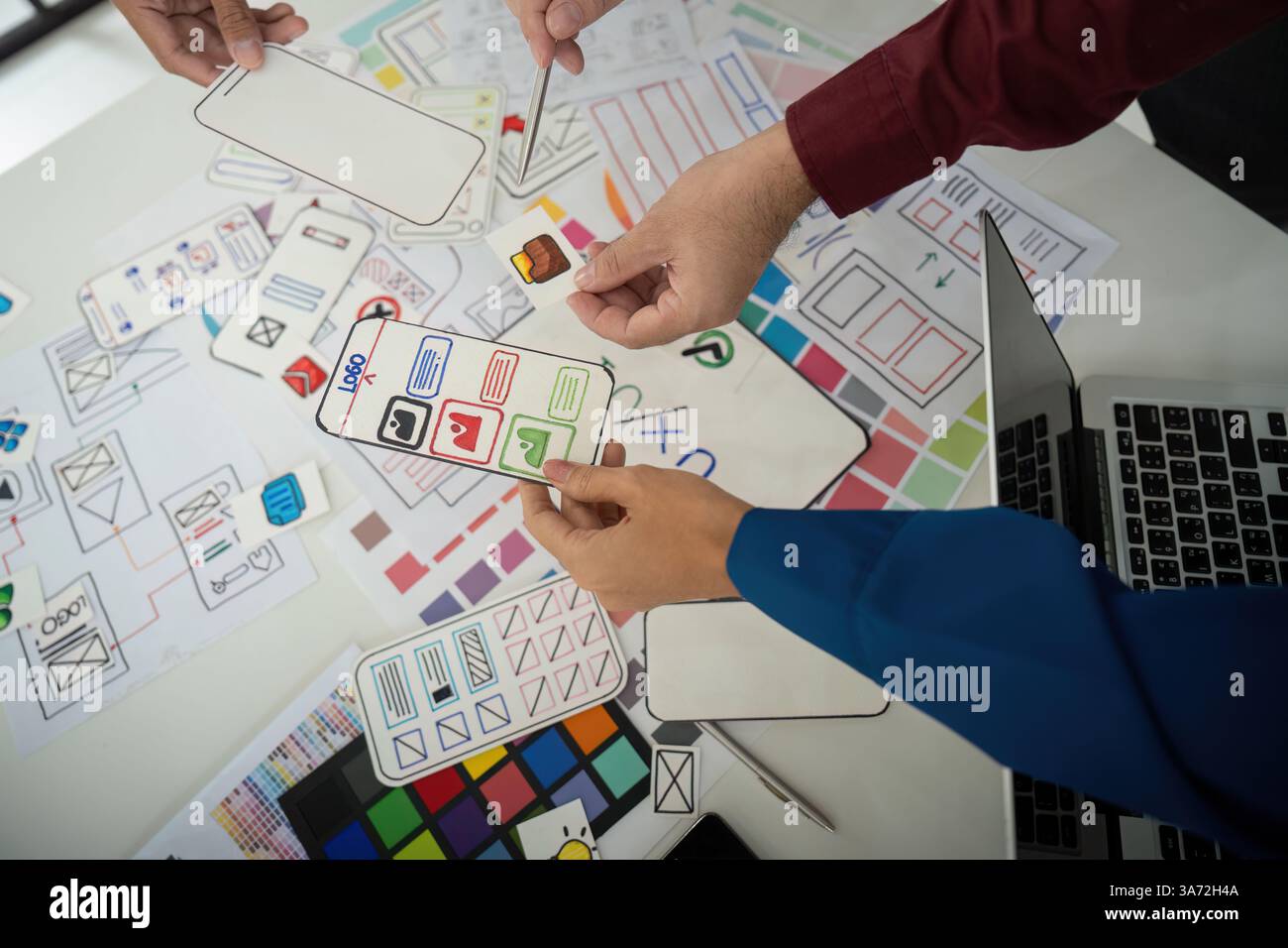 Team Coordination and Idea Exchange. Designers sharing layouts and ...