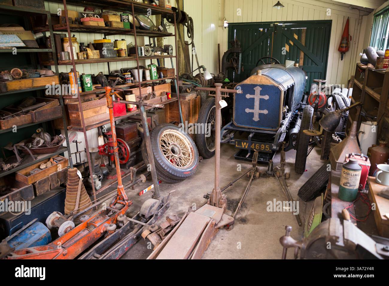Classic old vintage racing car in mechanic workshop / work shop / 1920s ...