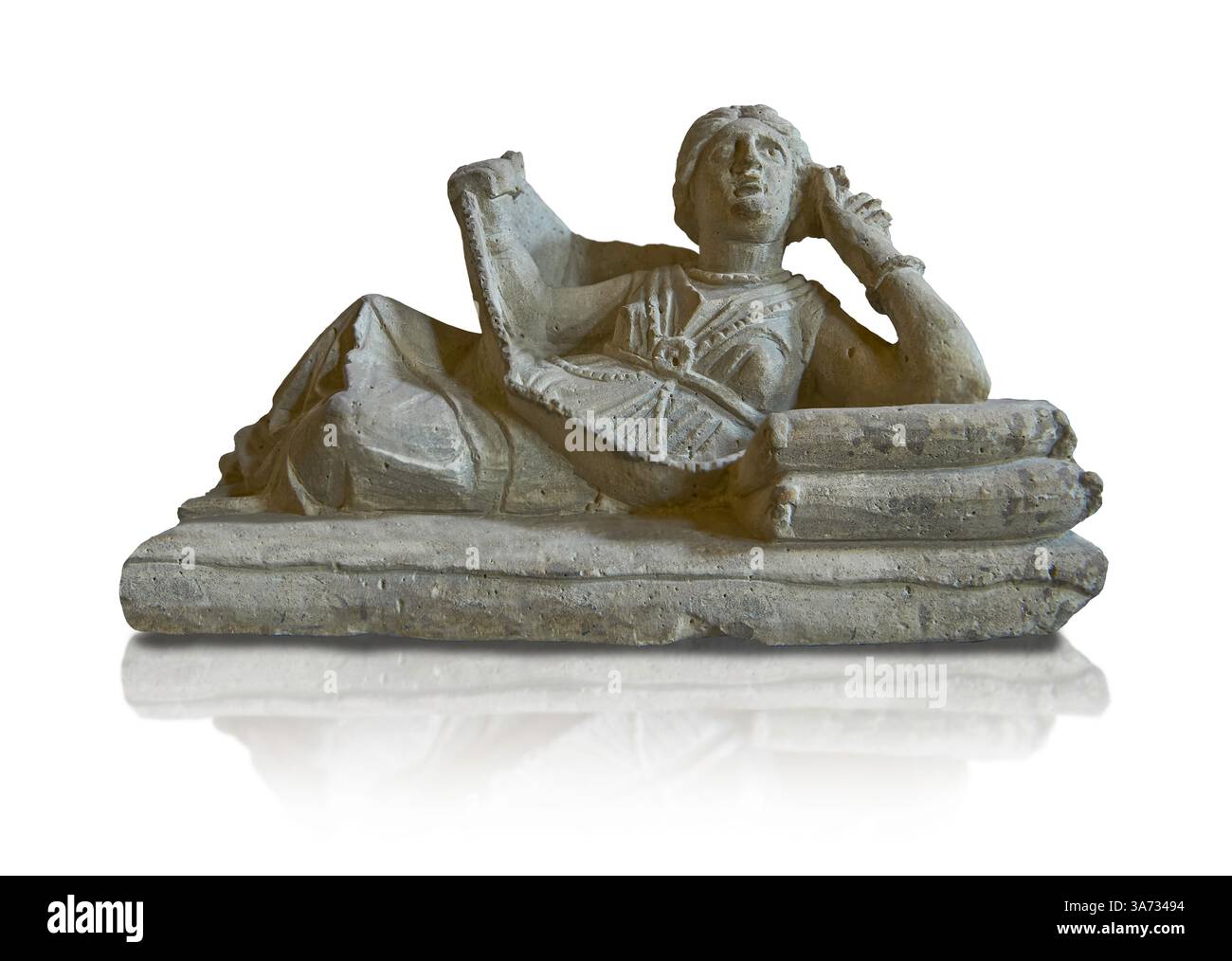 Reclining women on the lid of an Etruscan funerary cinerary urn ...